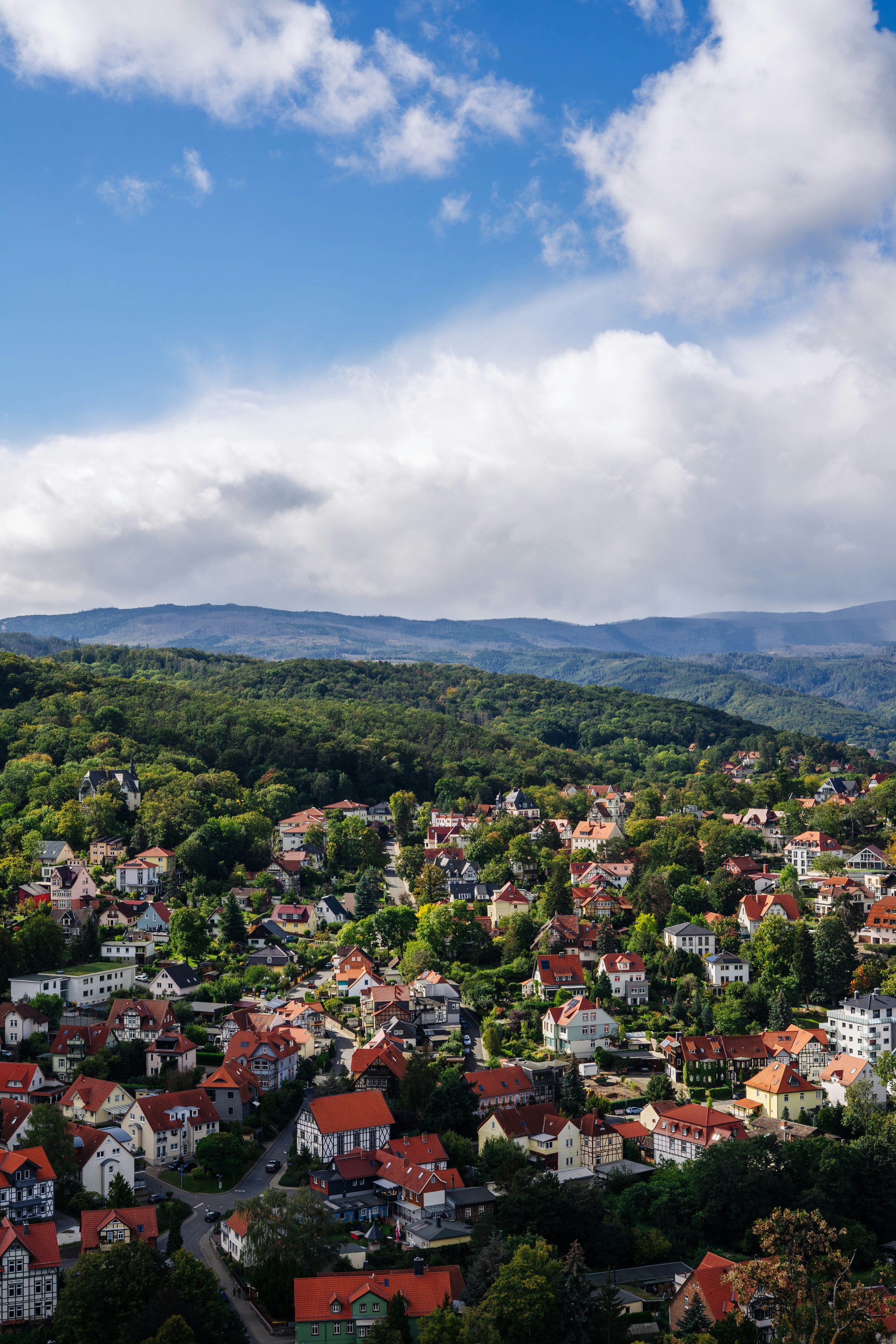 A view of a small town in the mountains photo – Free Timber frame Image ...