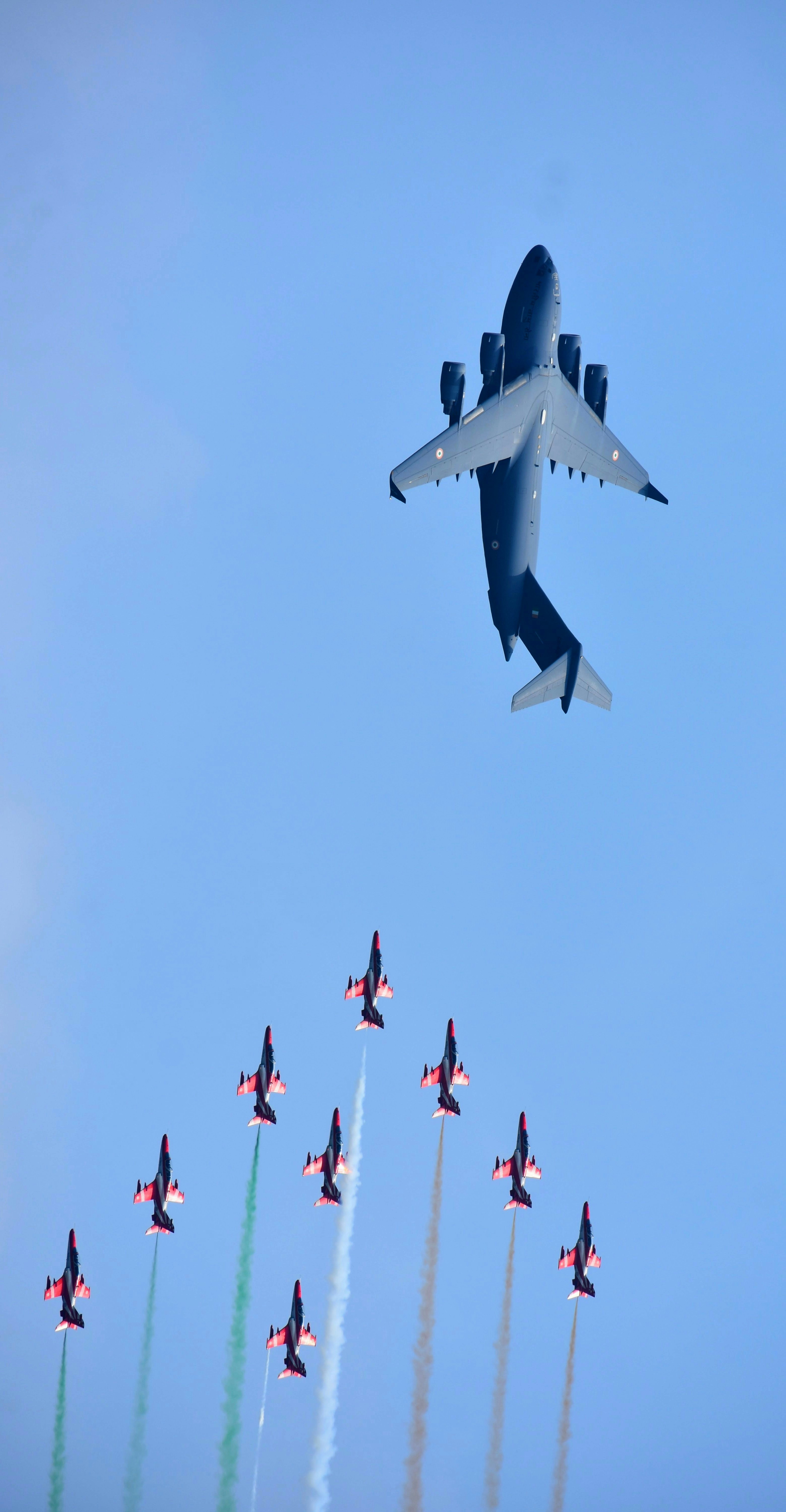 A group of planes flying in formation in the sky photo – Free Image on ...