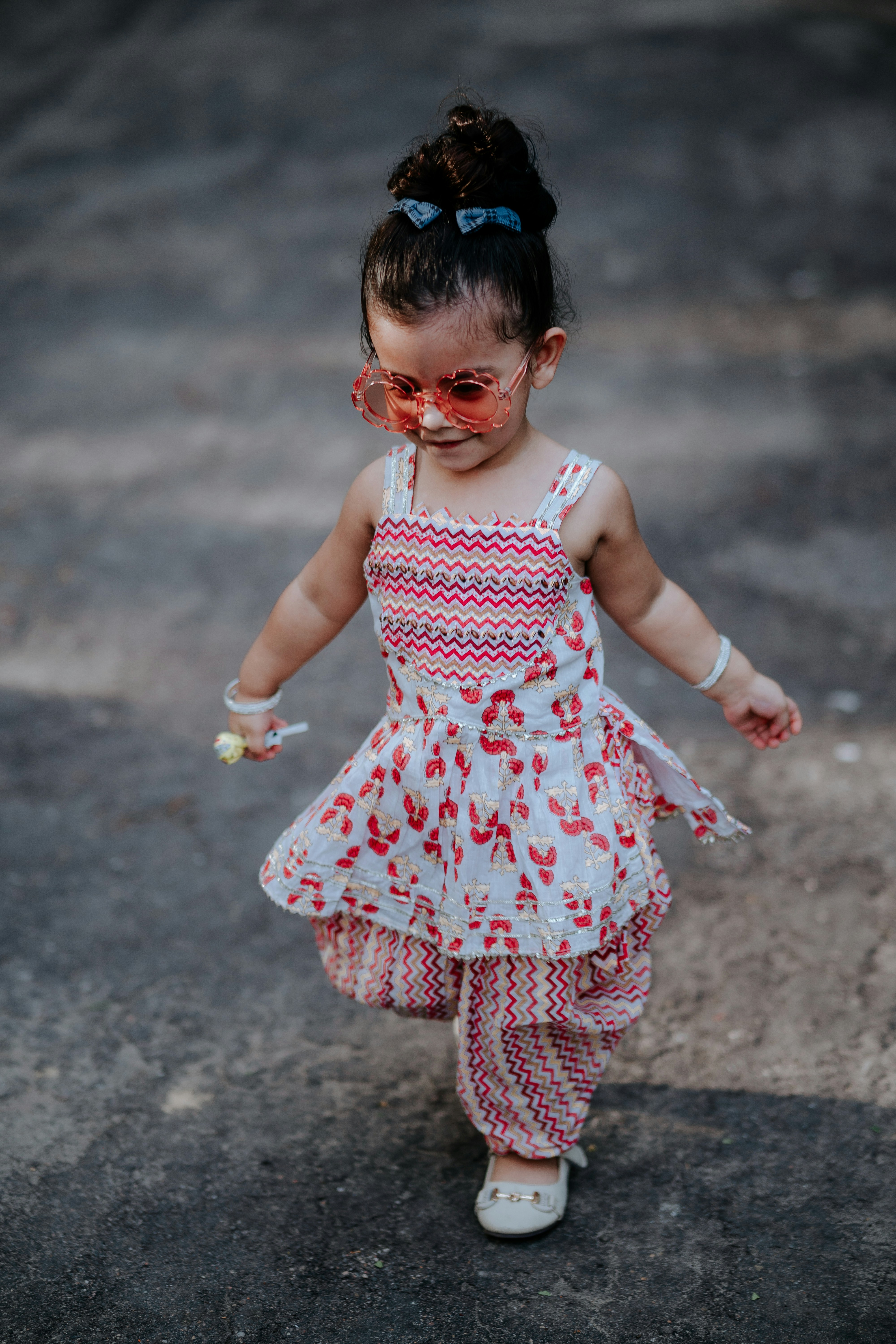 A little girl in a red and white dress photo – Free People Image on ...