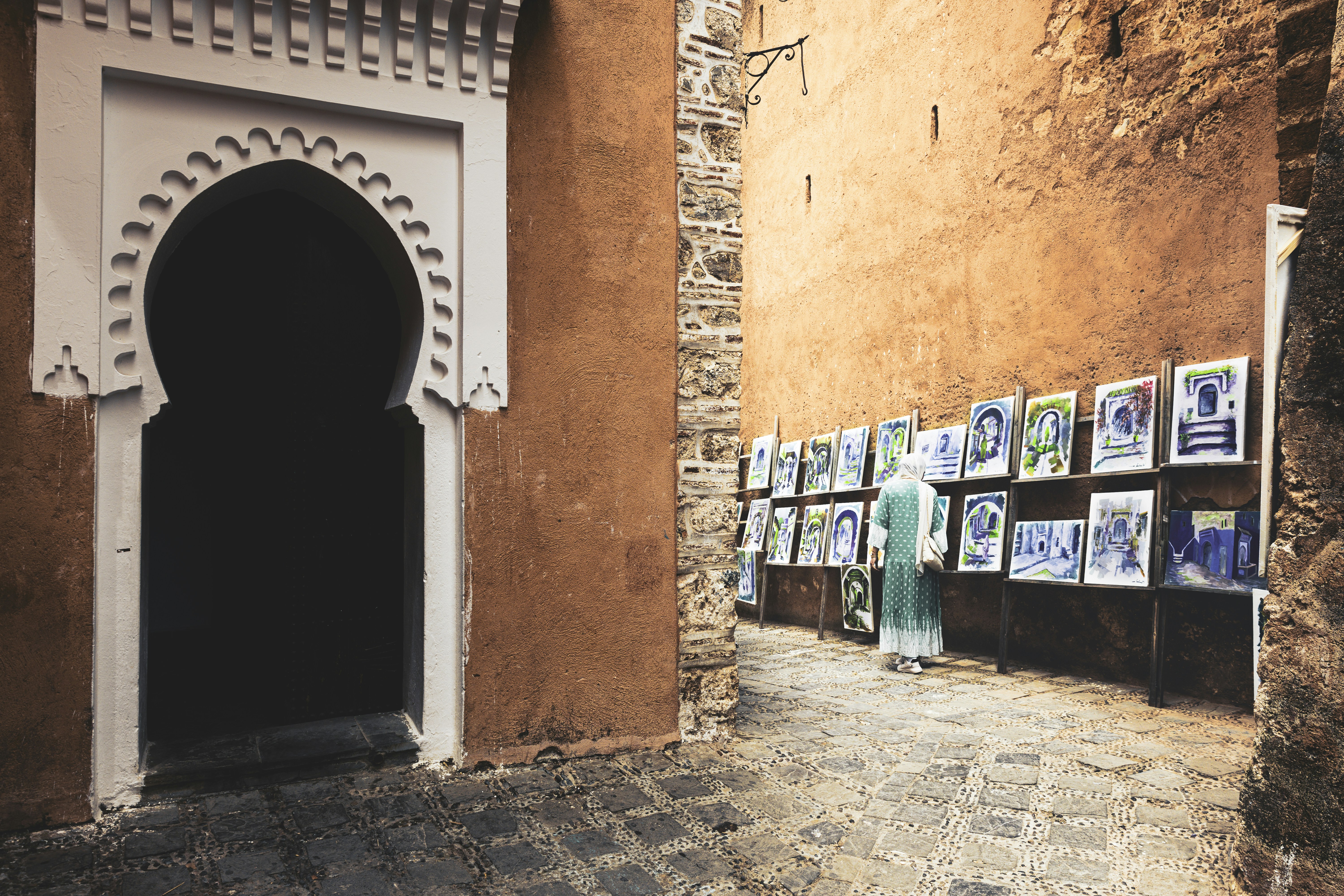 Arcade of Portraits along Weathered Walls