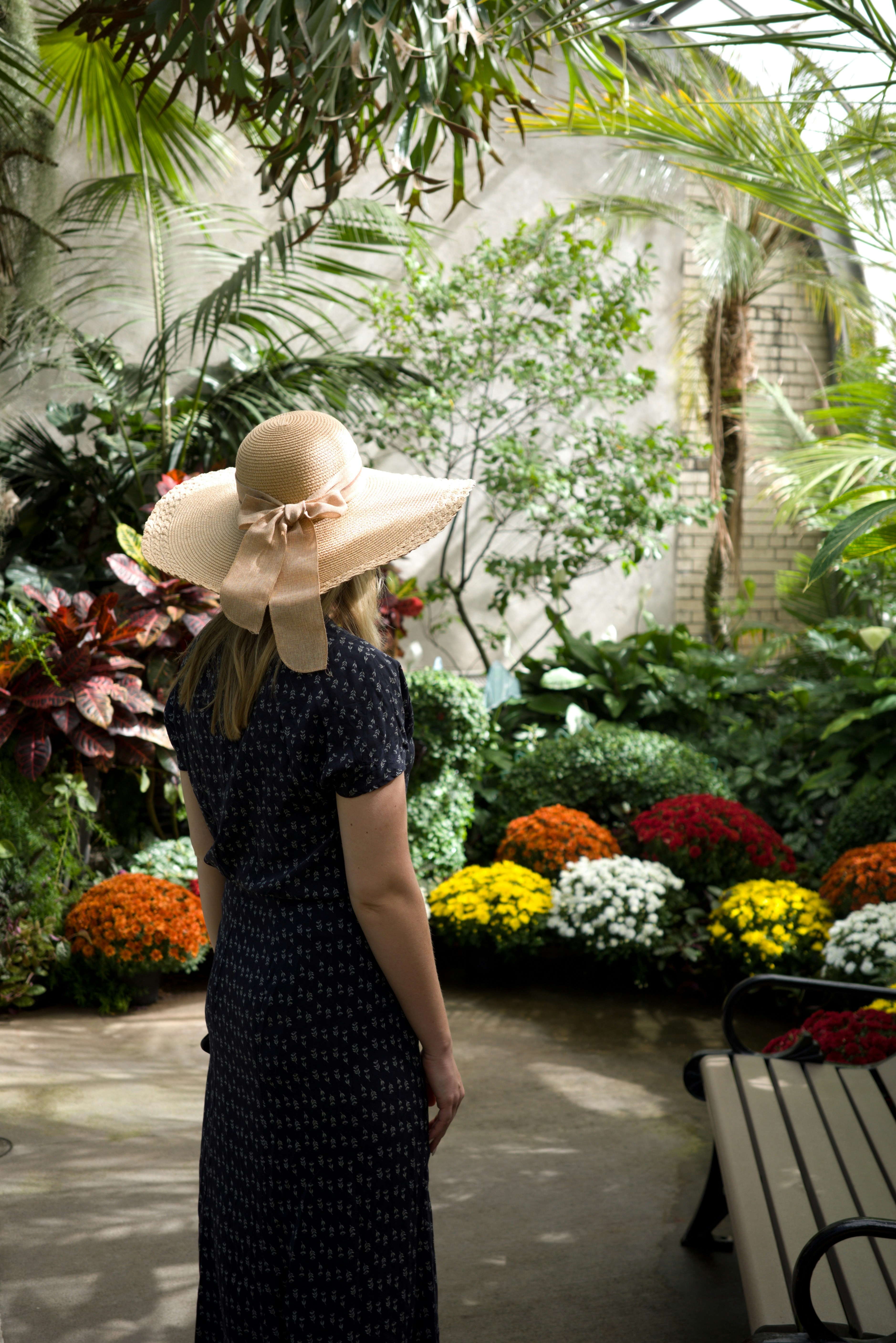 Straw Hat Portrait in a Garden of Chrysanthemums