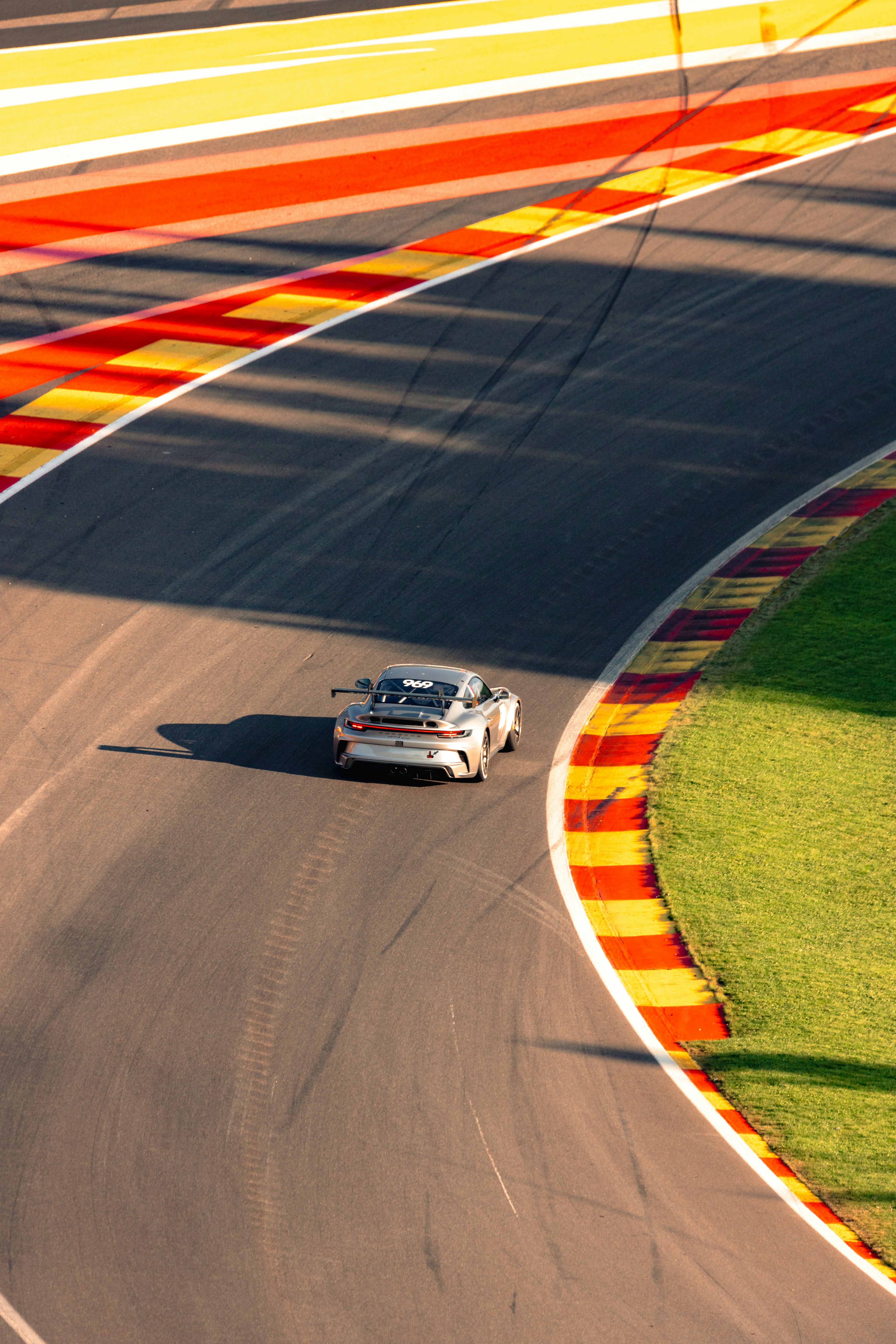 On the Edge: A Silver Racer Navigates the Painted Curves