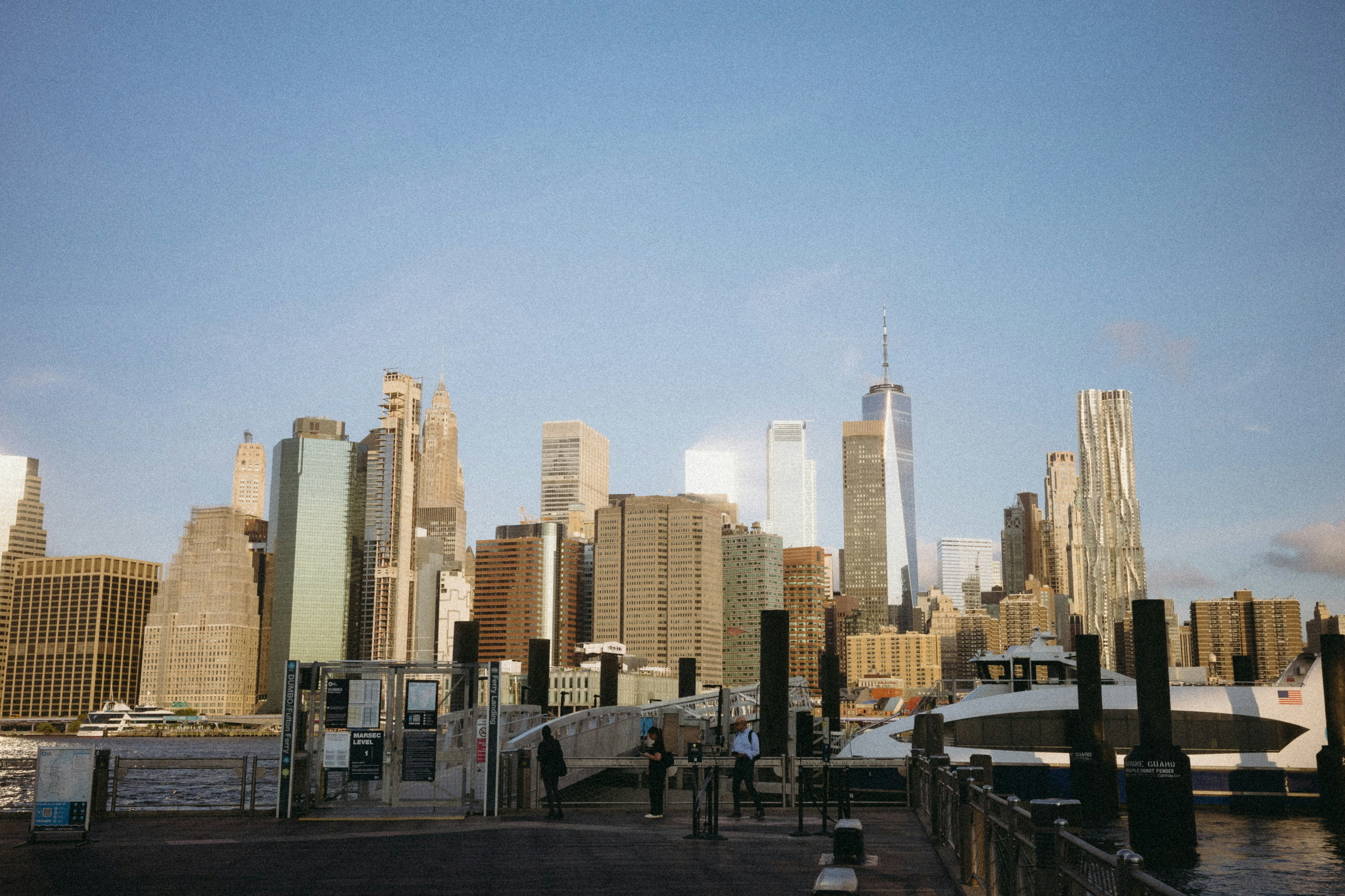 Glass Giants on the Waterfront: Pier-Edge Vista of Manhattan Skyline