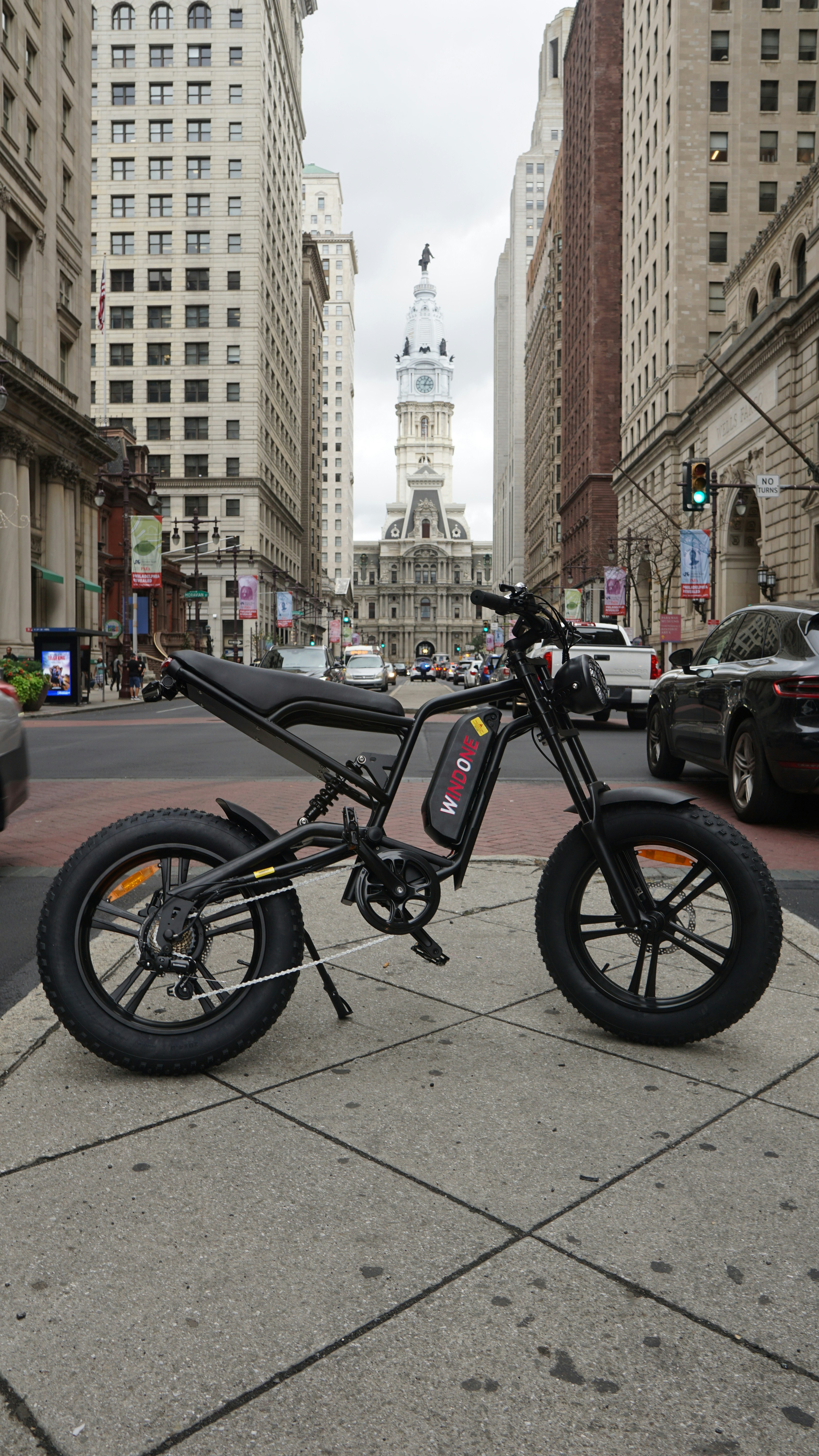 Urban Echo: A Bold Electric Ride Surfaces Against a Clocktower Street