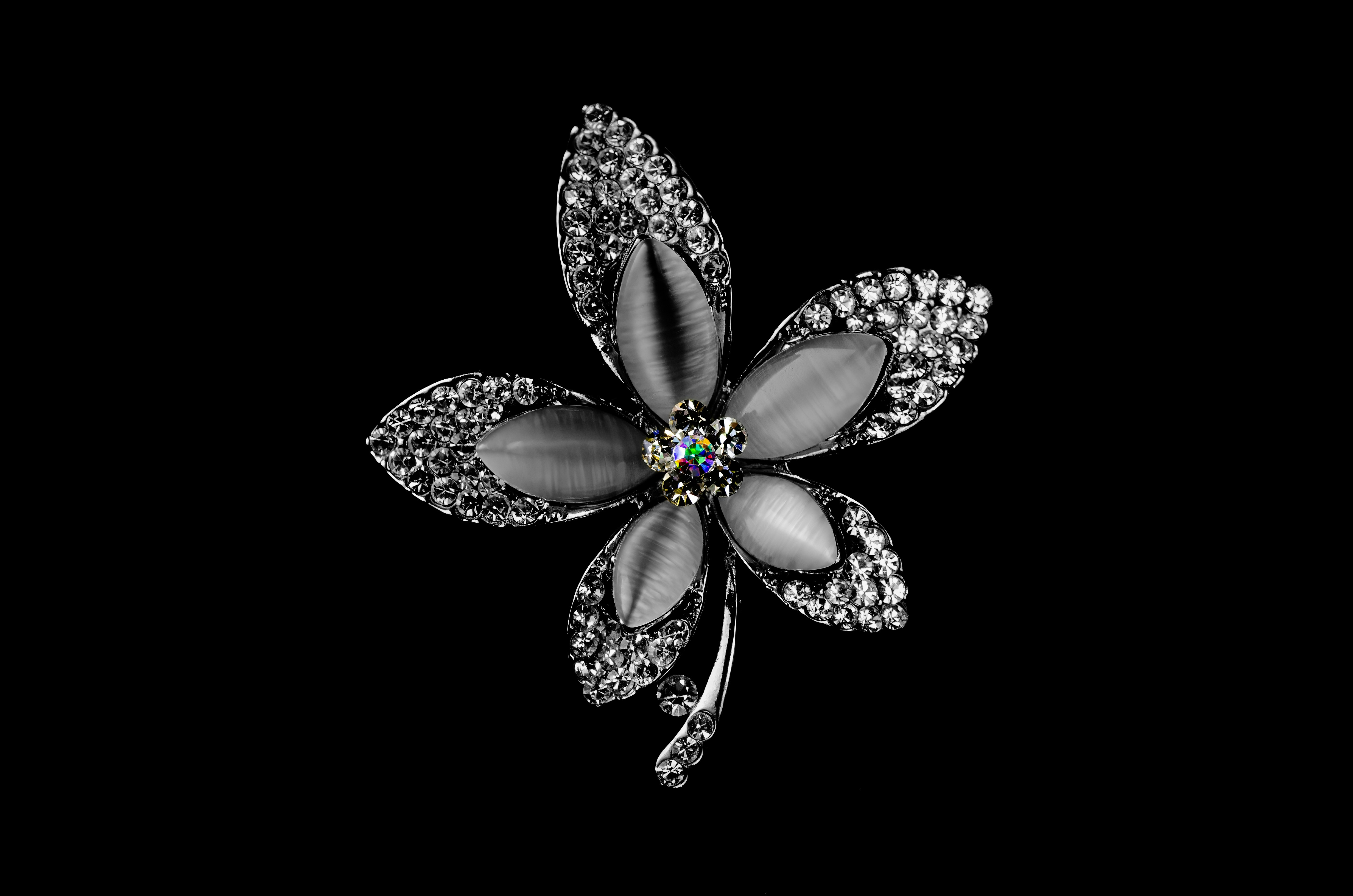 Glistening Diamond-Haloed Orchid Pendant Suspended in Velvet Black