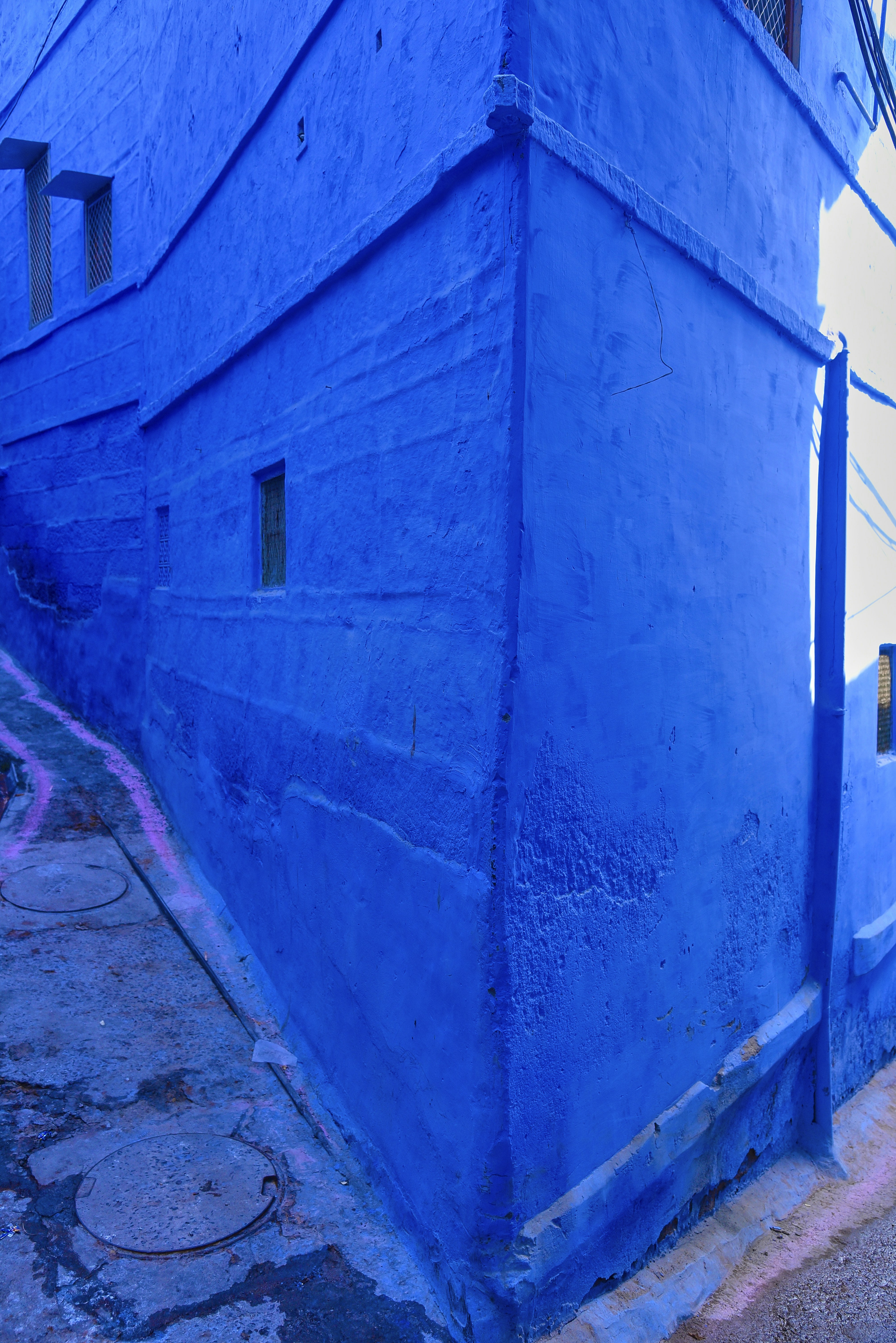 Cobalt Corner: An Alley Painted in Relentless Blue
