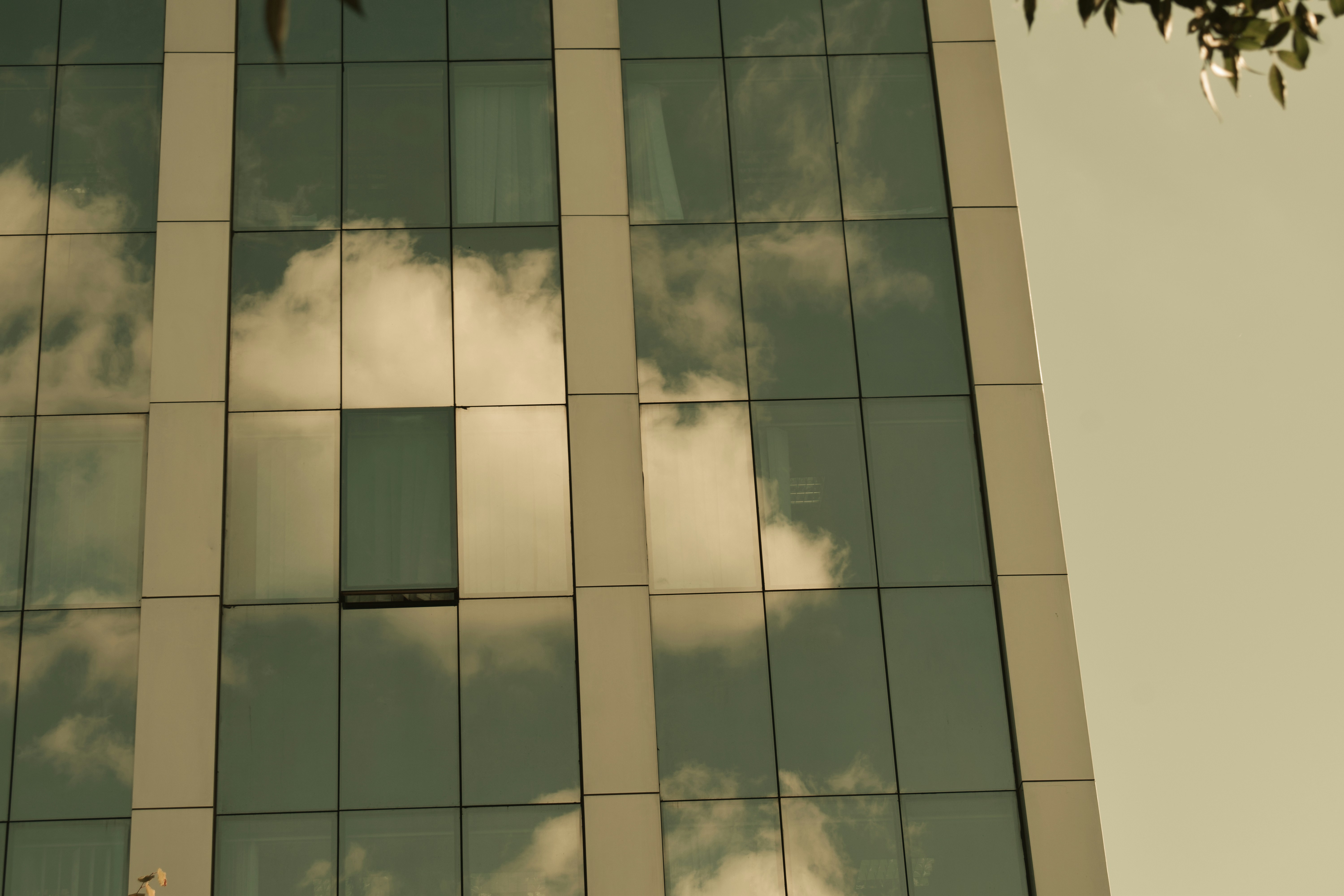 The reflection of a building in the windows of another building photo ...