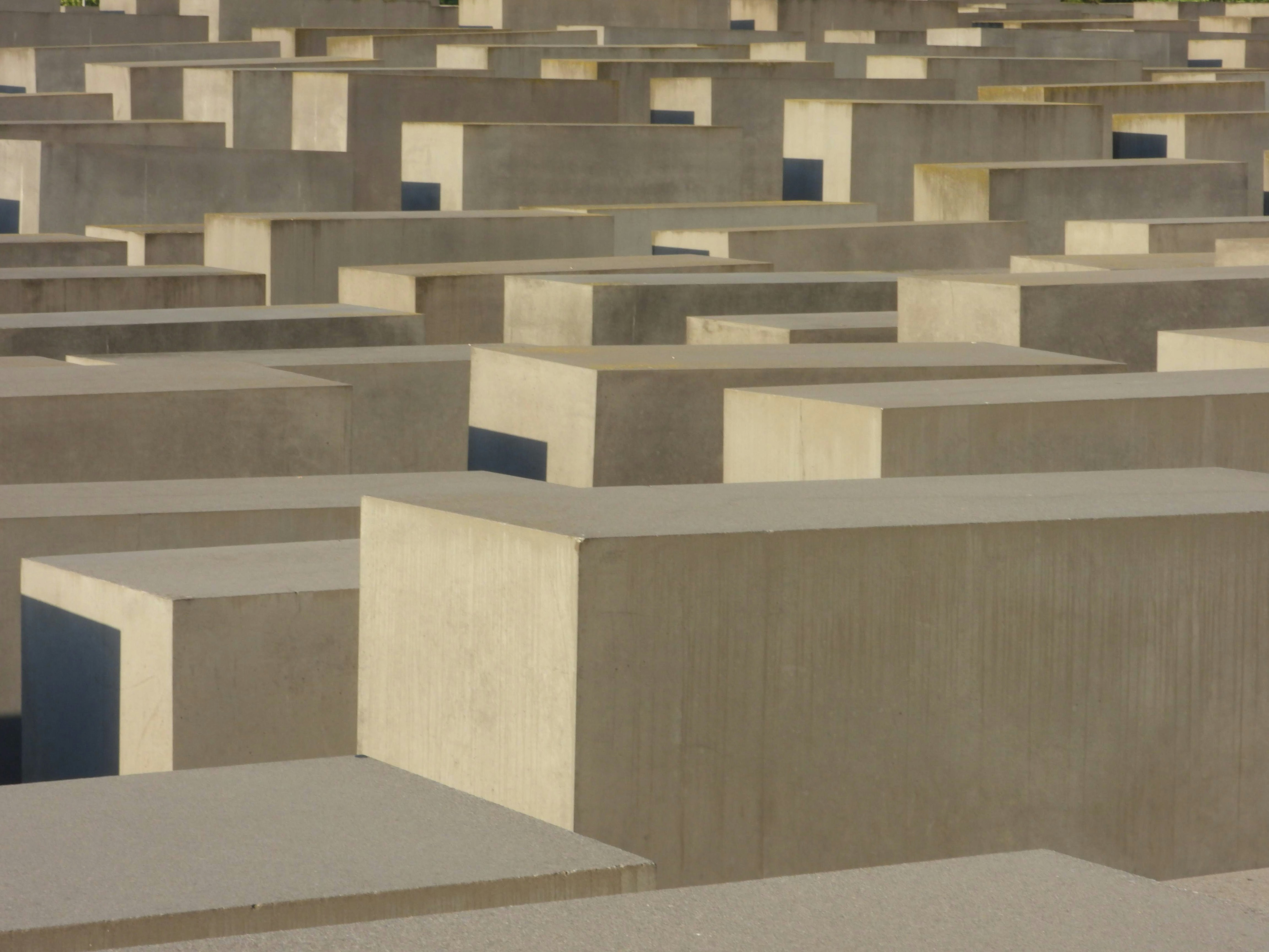 A bunch of cement blocks that are in a field photo – Free Berlin Image ...