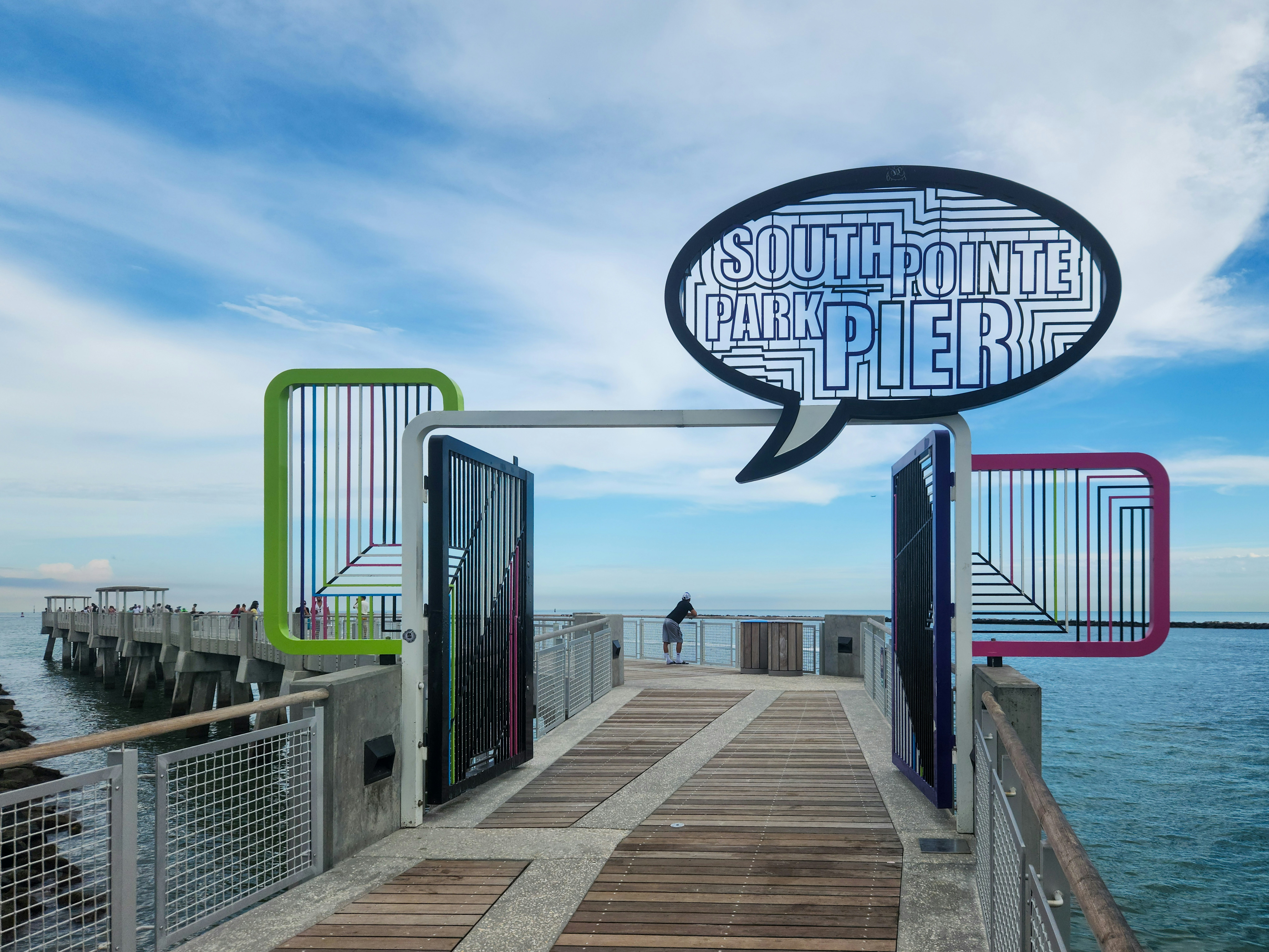 A sign that is on the side of a pier photo – Free South pointe park ...
