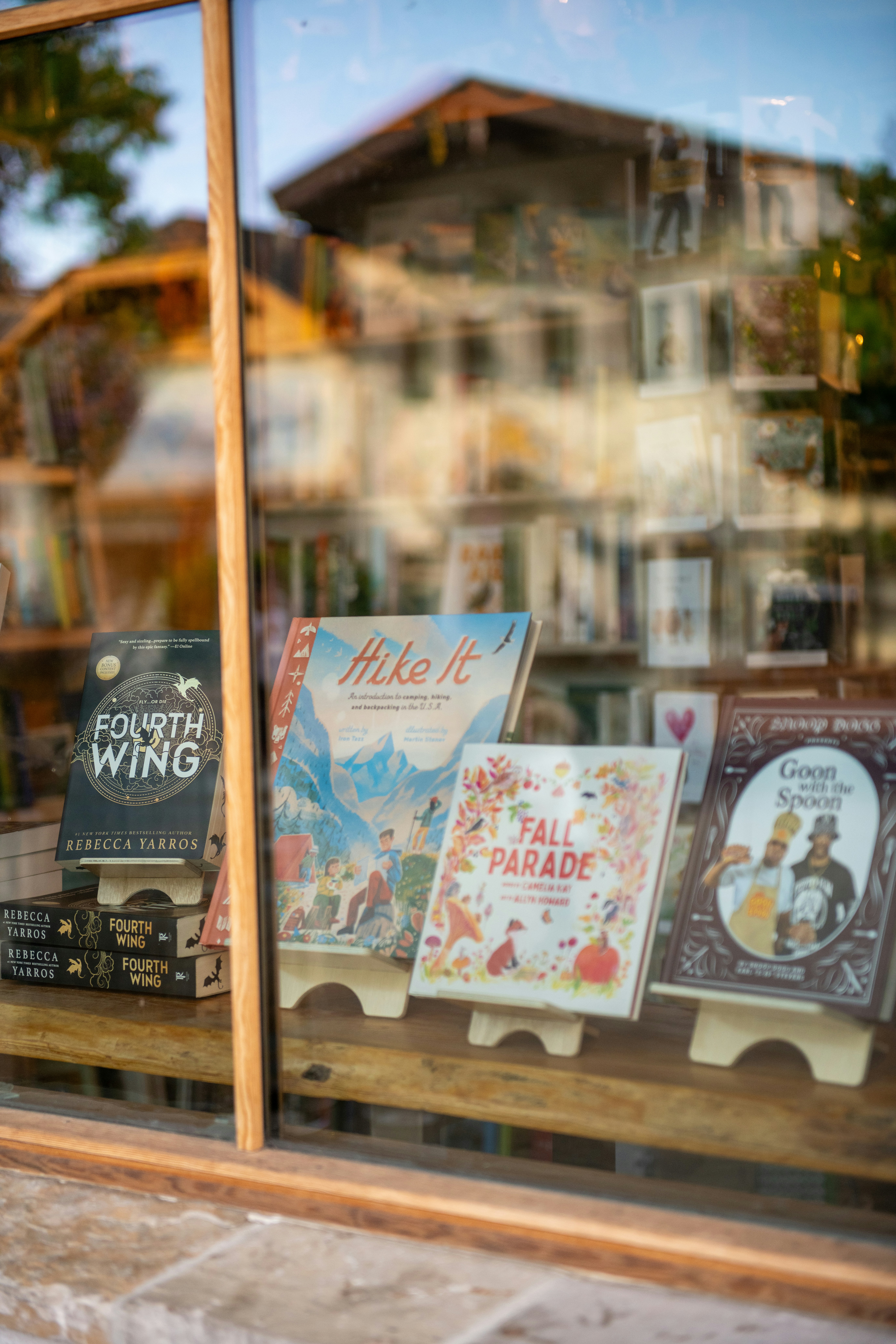A store window with a bunch of books in it