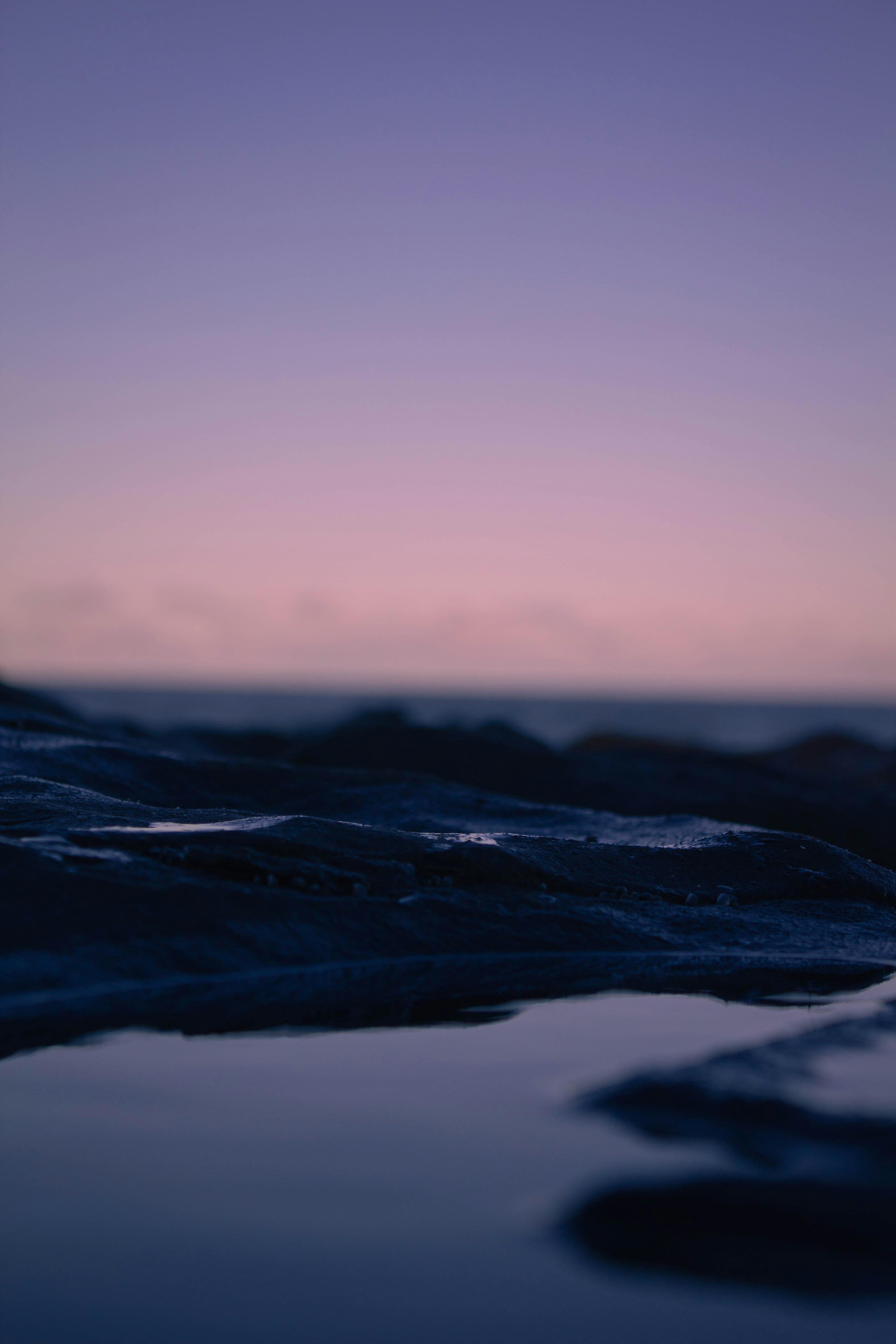 Horizon of Violet and Silk: Quiet Twilight on the Rocks
