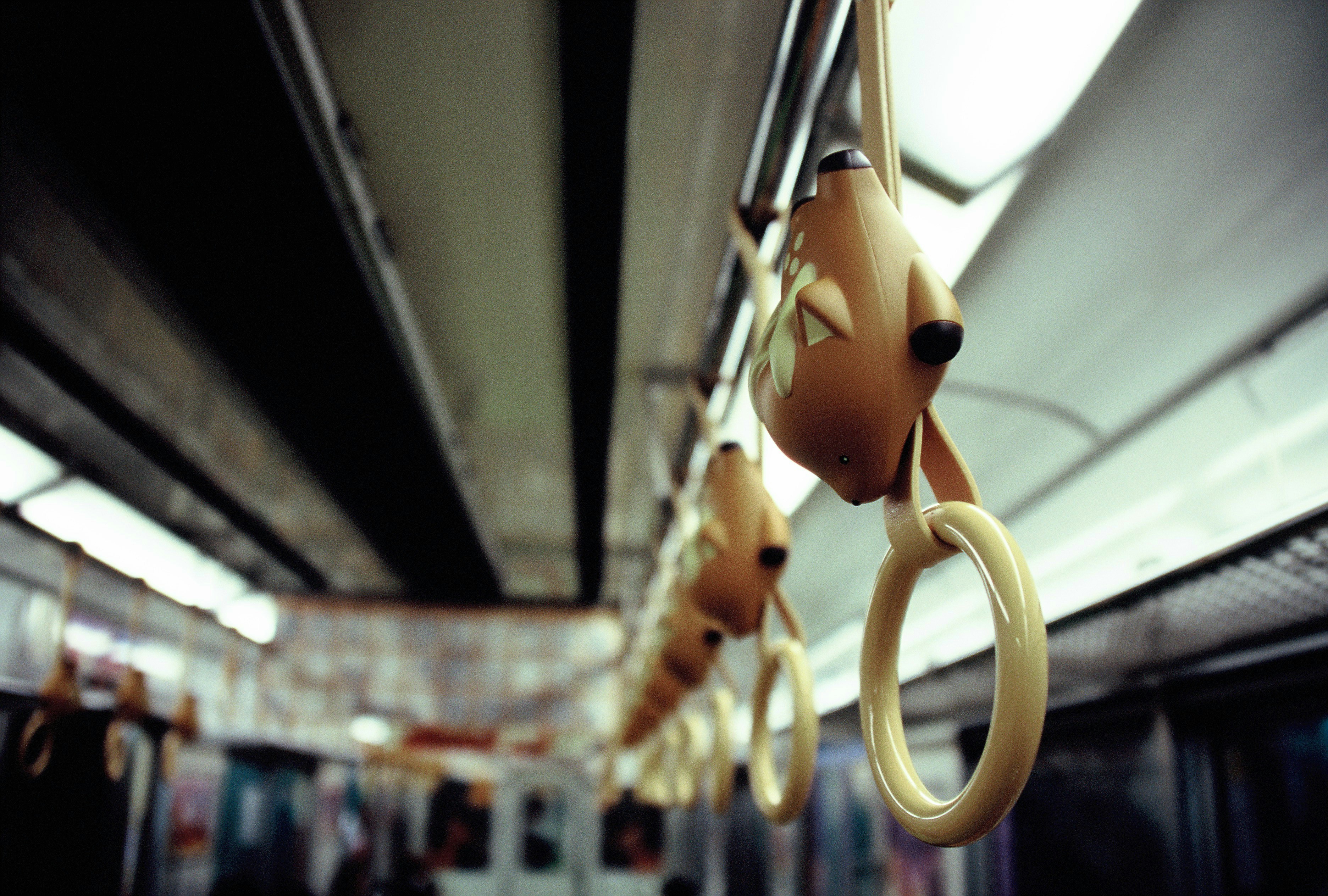 A long line of hanging objects on a train photo – Free Japan Image on ...