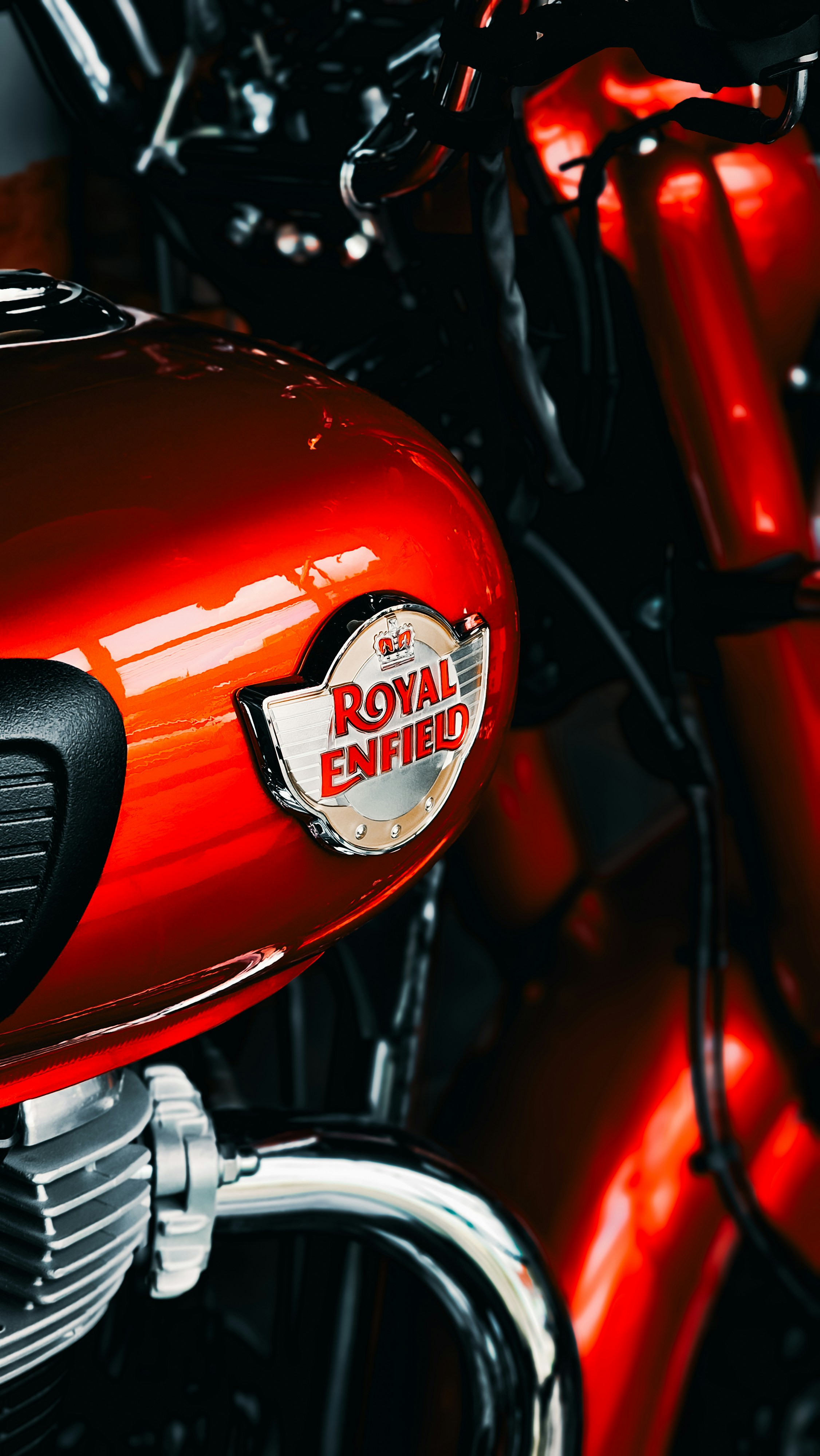 Crimson Chrome Portrait: Royal Enfield's Red Tank in Focus