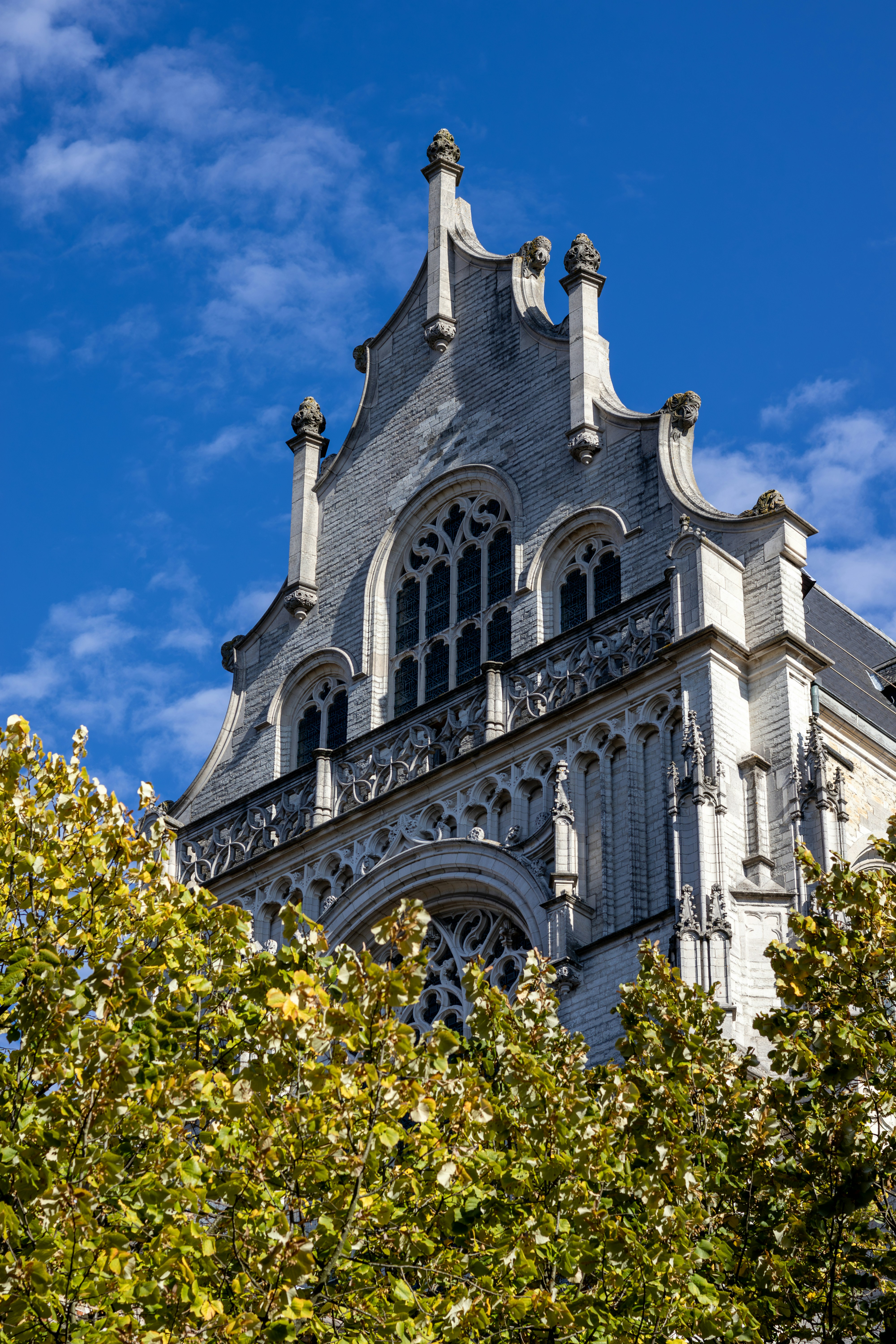A very tall building with a clock on it's sideHendrik Prinsloo