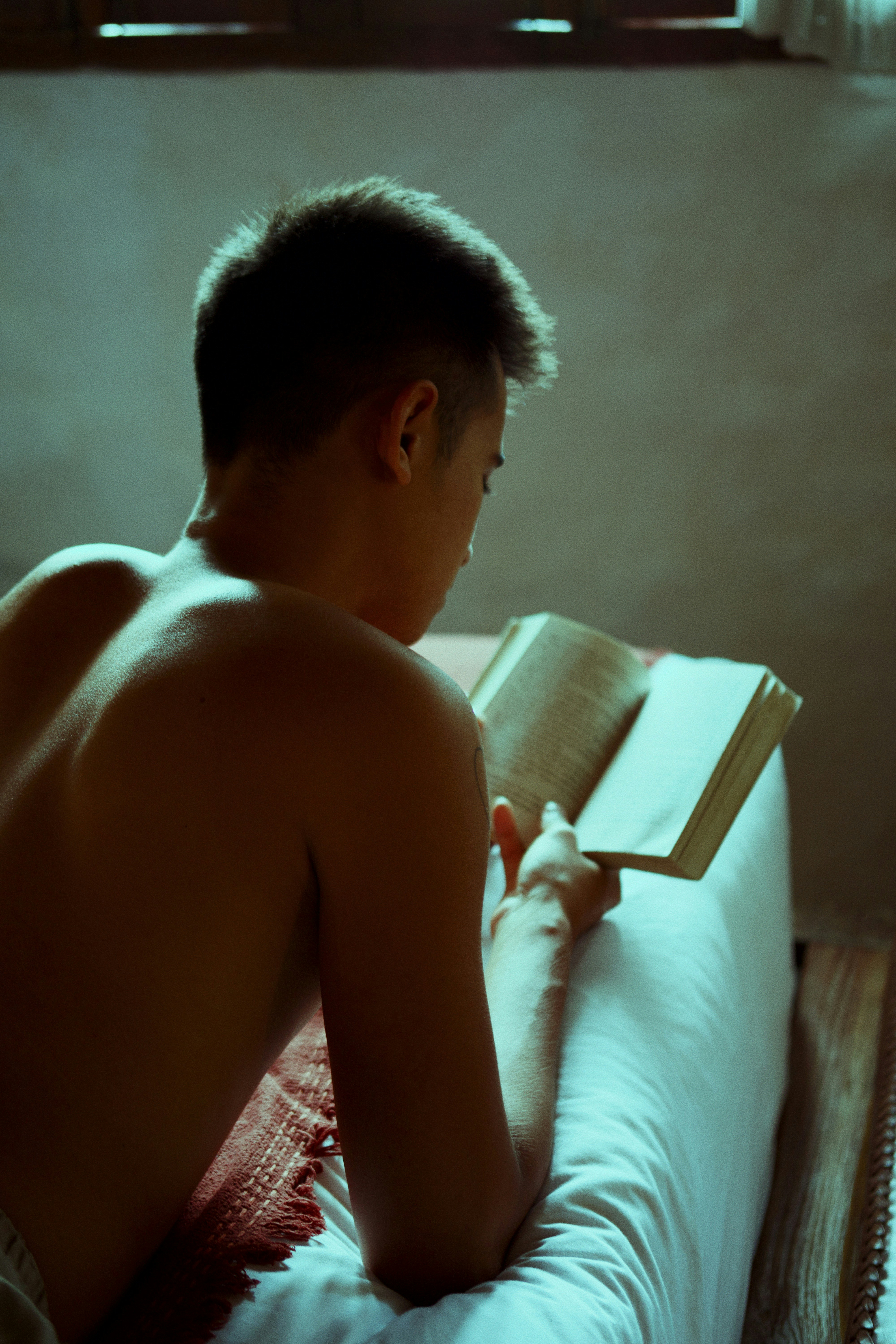 Intimate Quiet: Reading by Teal Window Light
