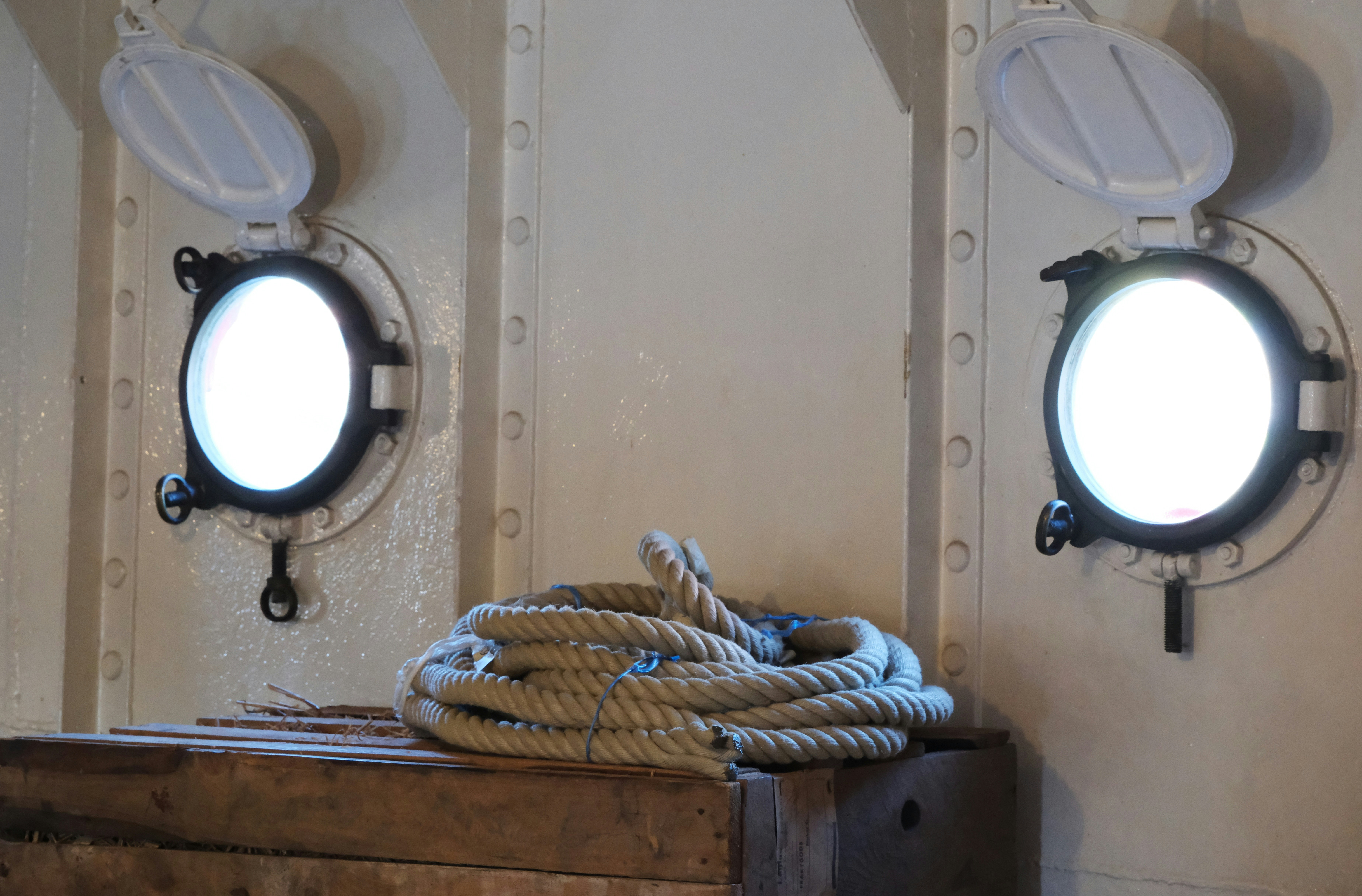Rope Coil Between Twin Portholes: A Maritime Still Life