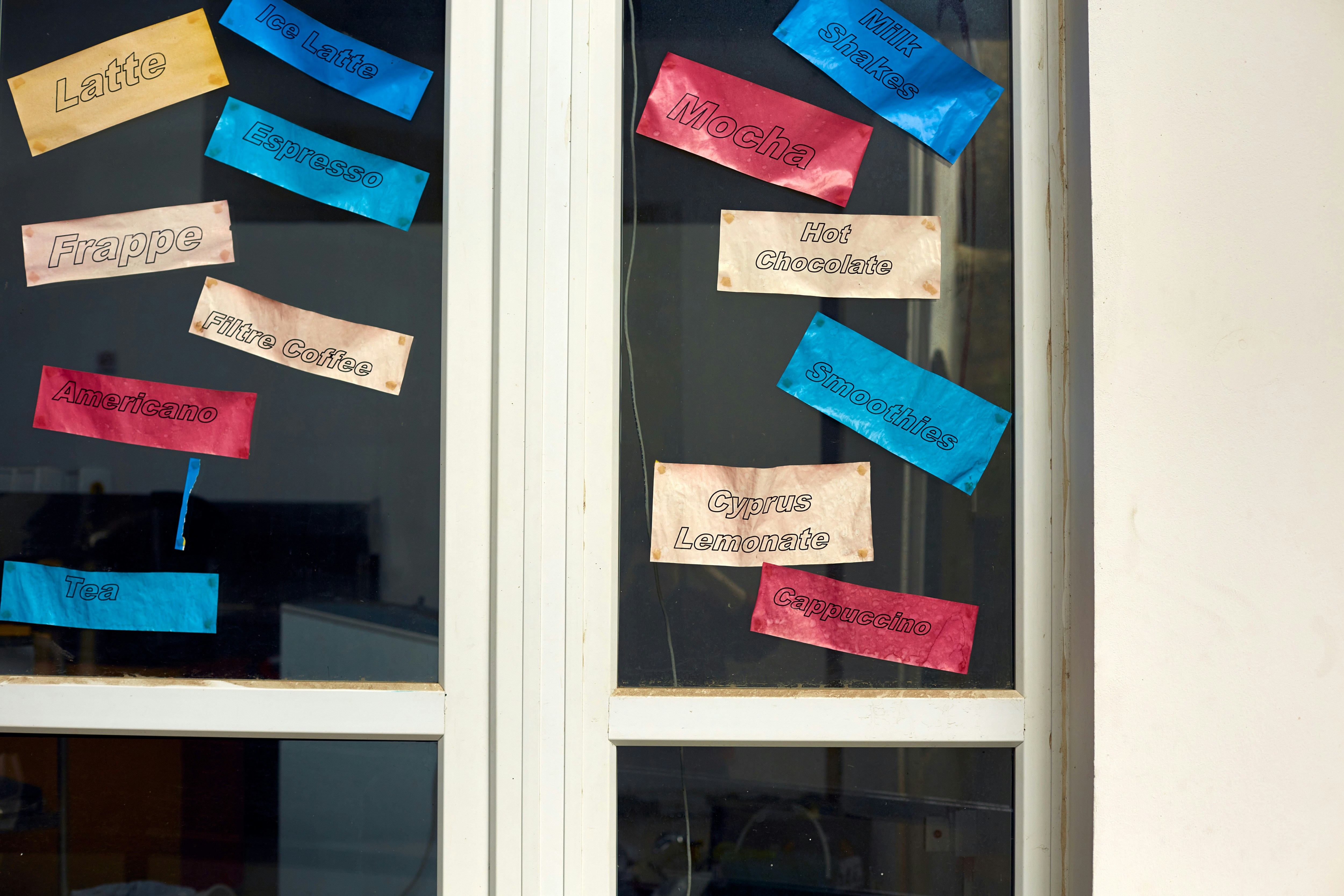 A window with a bunch of sticky notes attached to it photo – Free ...
