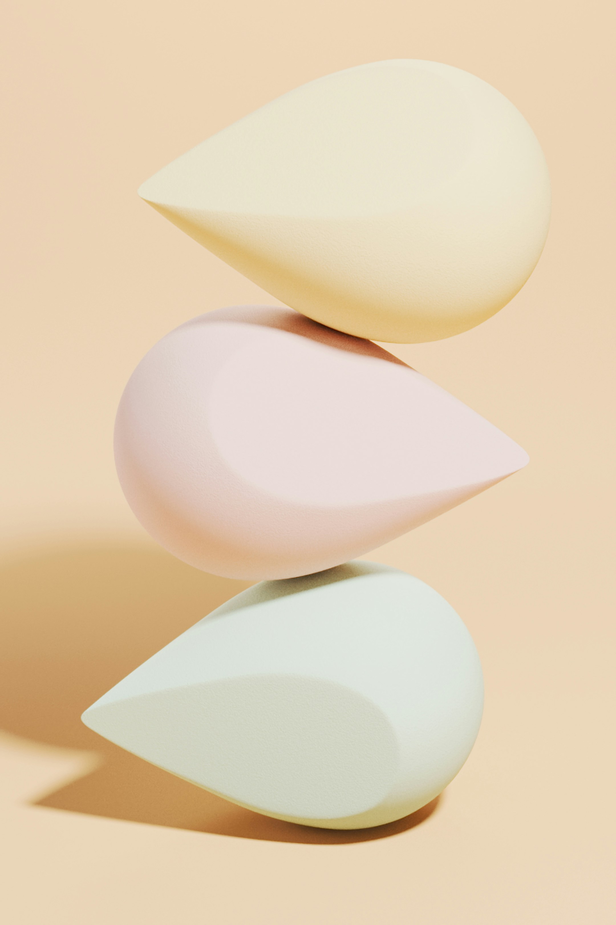 A stack of three different colored shapes photo – Free Digital image ...