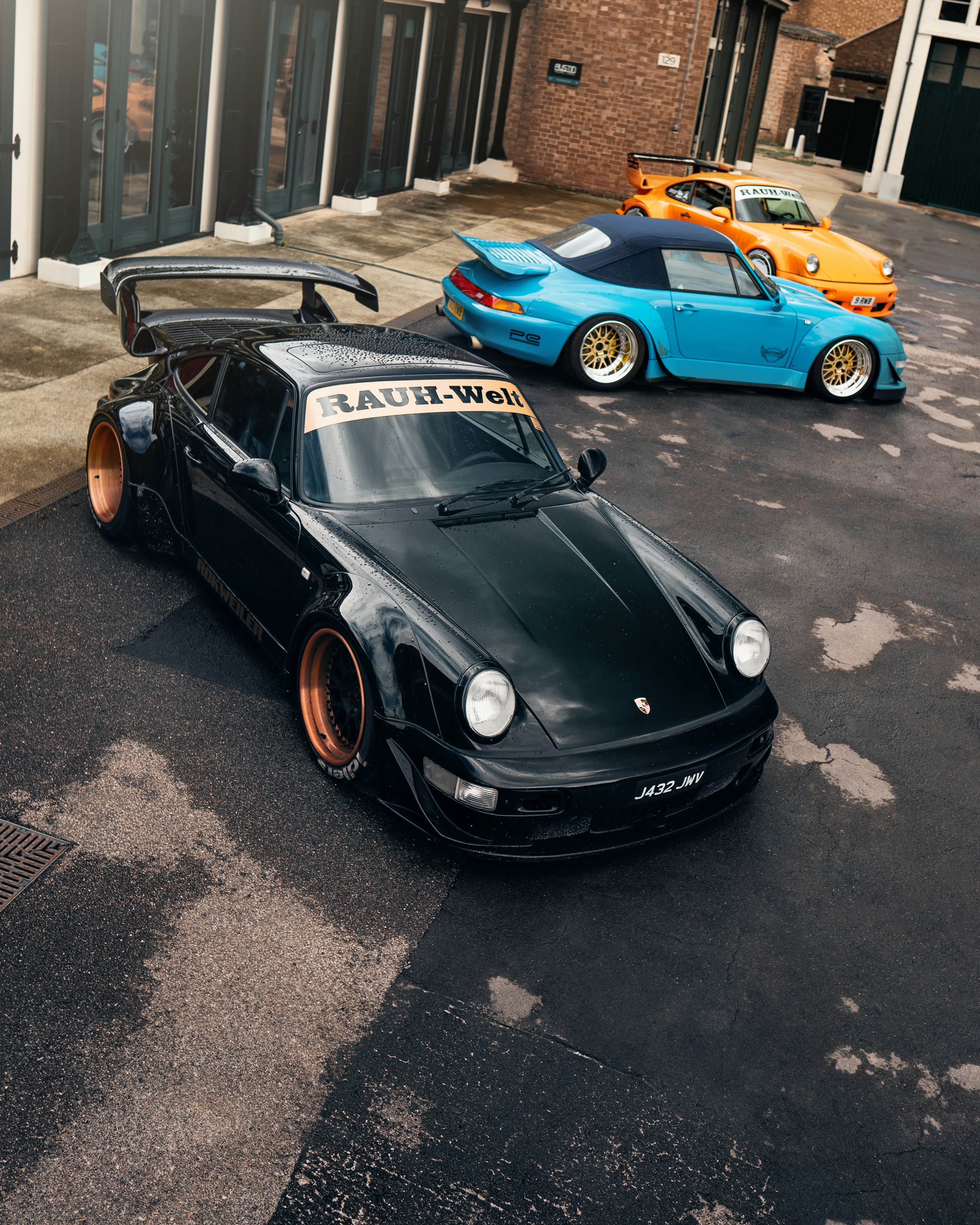 A couple of cars parked in front of a building photo – Free Bicester ...