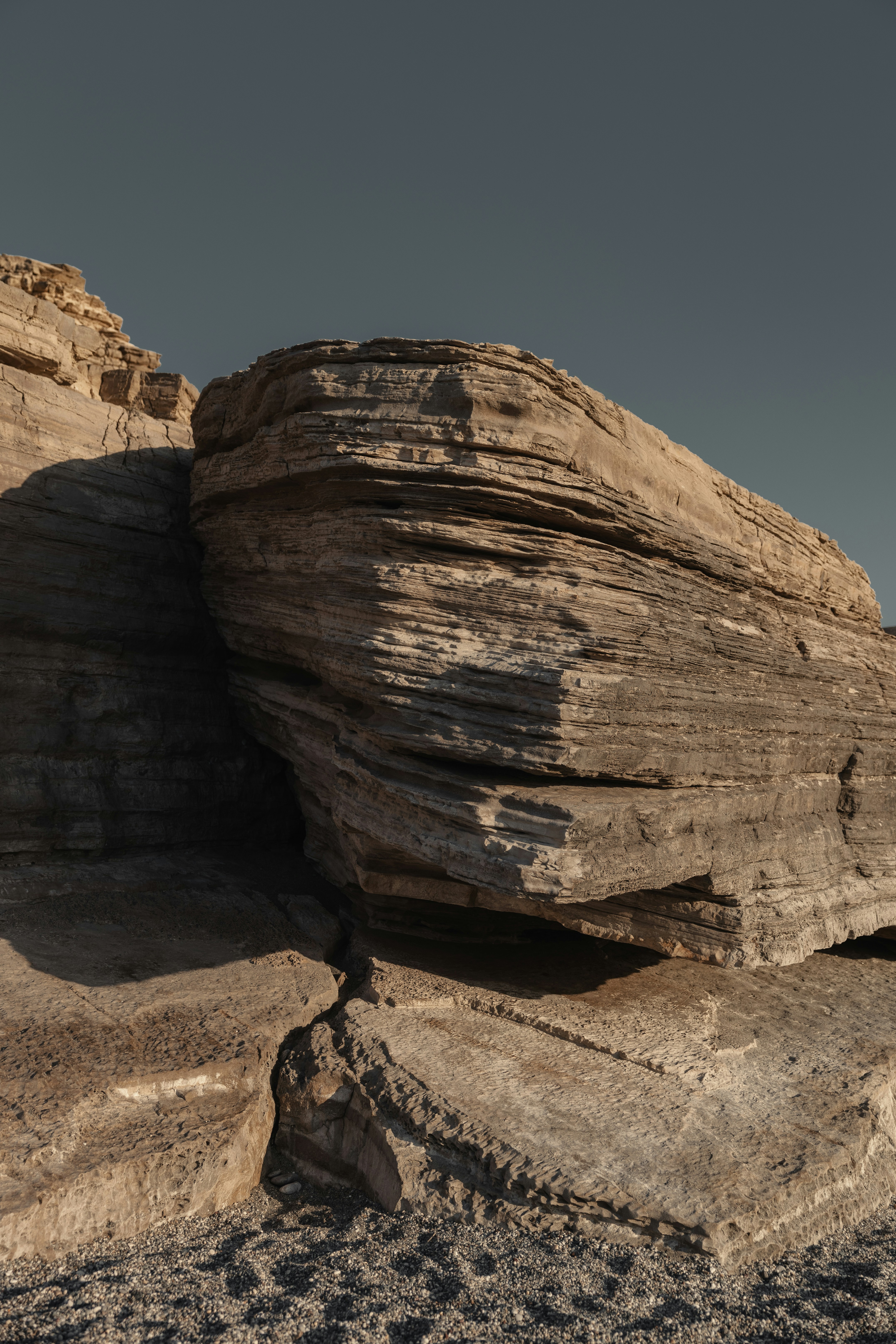 A large rock formation in the middle of a desert photo – Free Texture ...