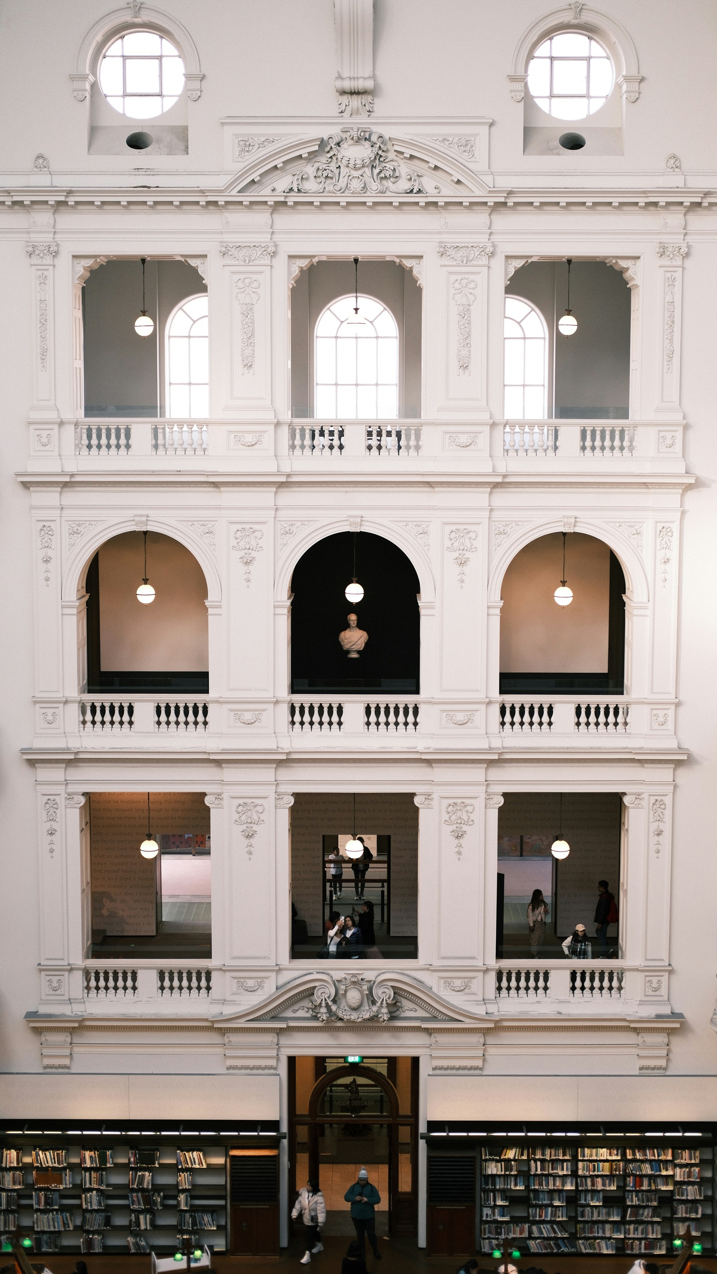 An overhead view of a library filled with books photo – Free Wallpaper ...