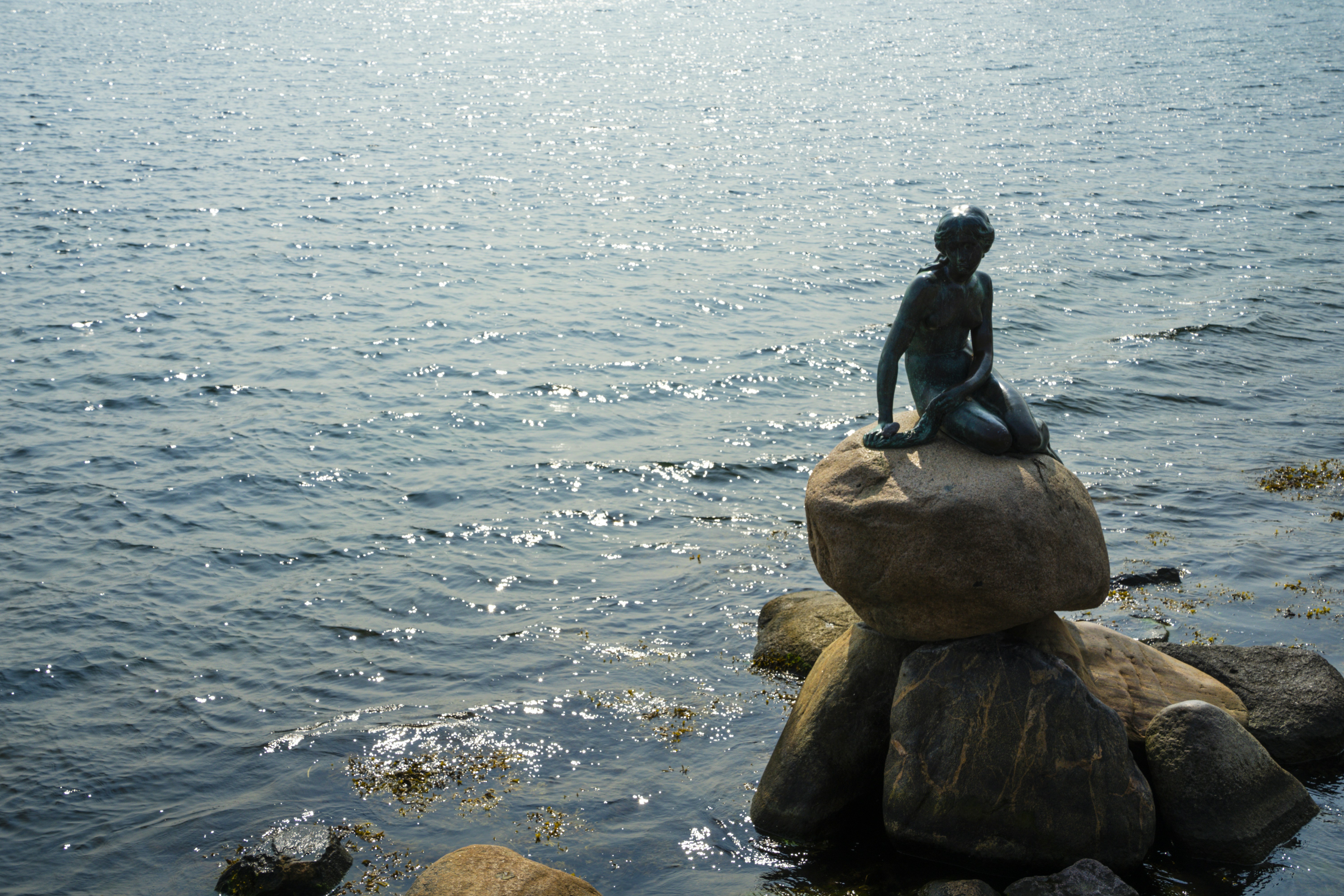 Mermaid on Granite: Quiet Sentinel at the Sea's Edge