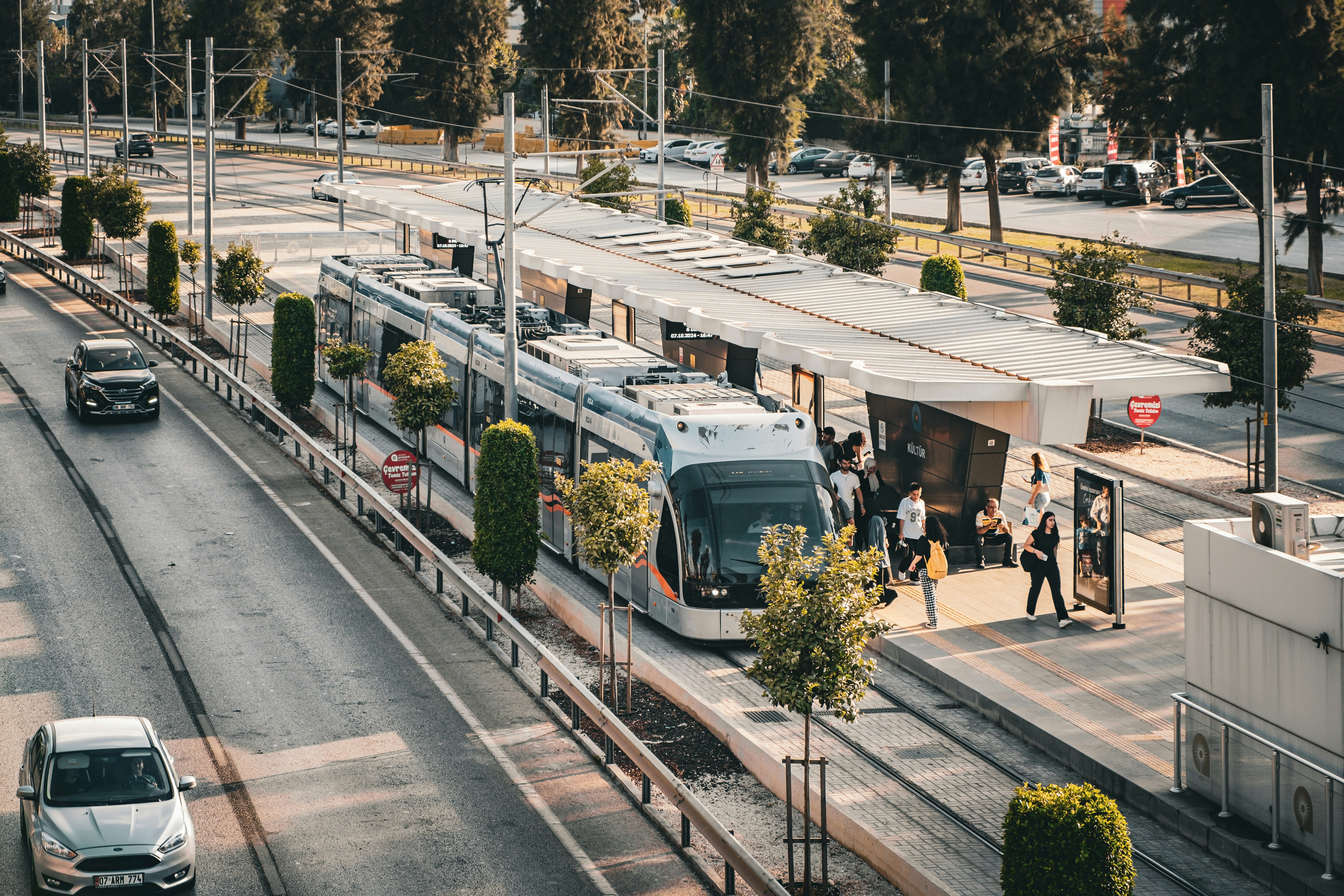 Urban Transit Harmony: A Moment at the Tram Stop