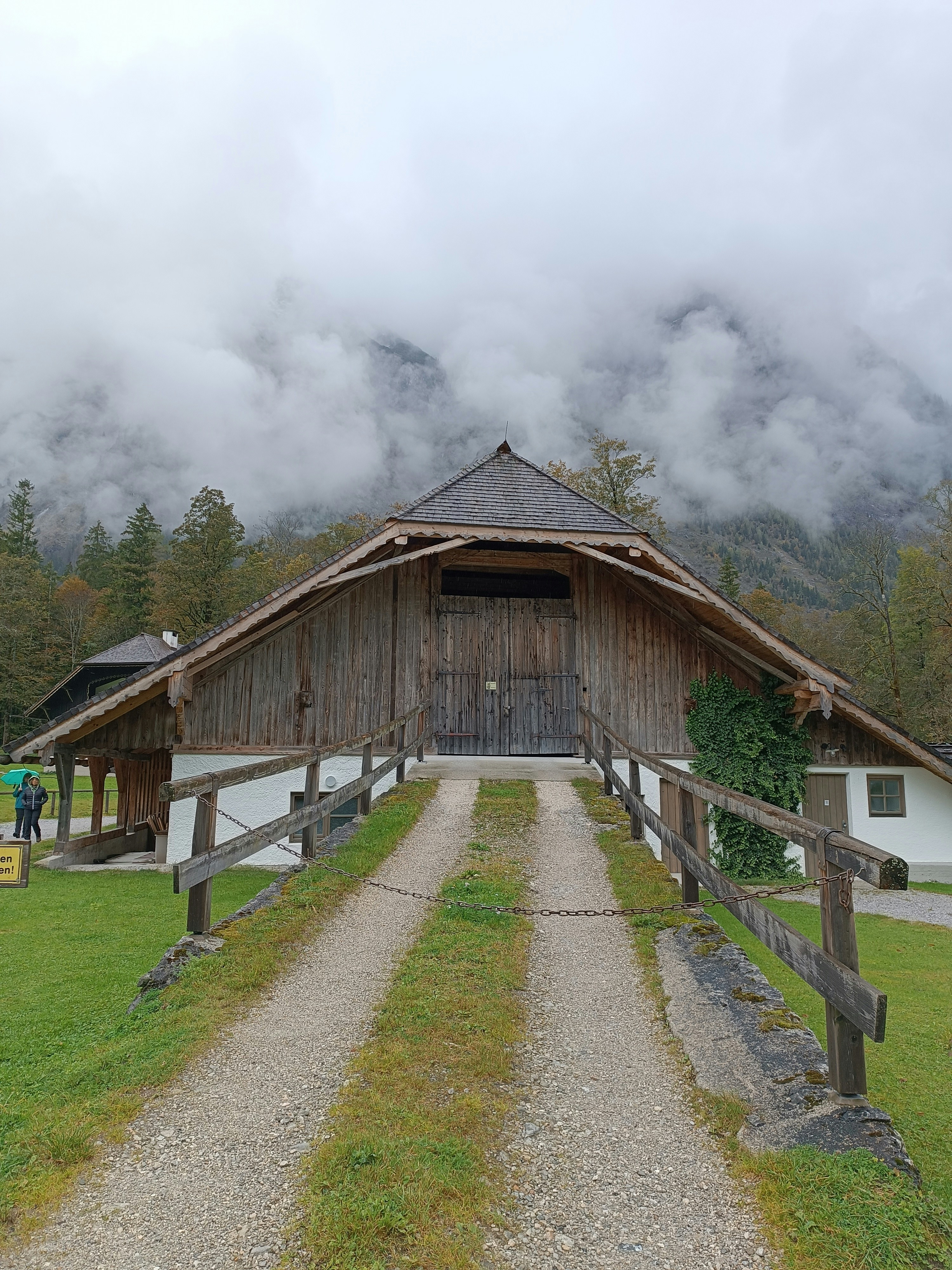 A wooden barn with a walkway leading to it photo – Free Königssee Image ...