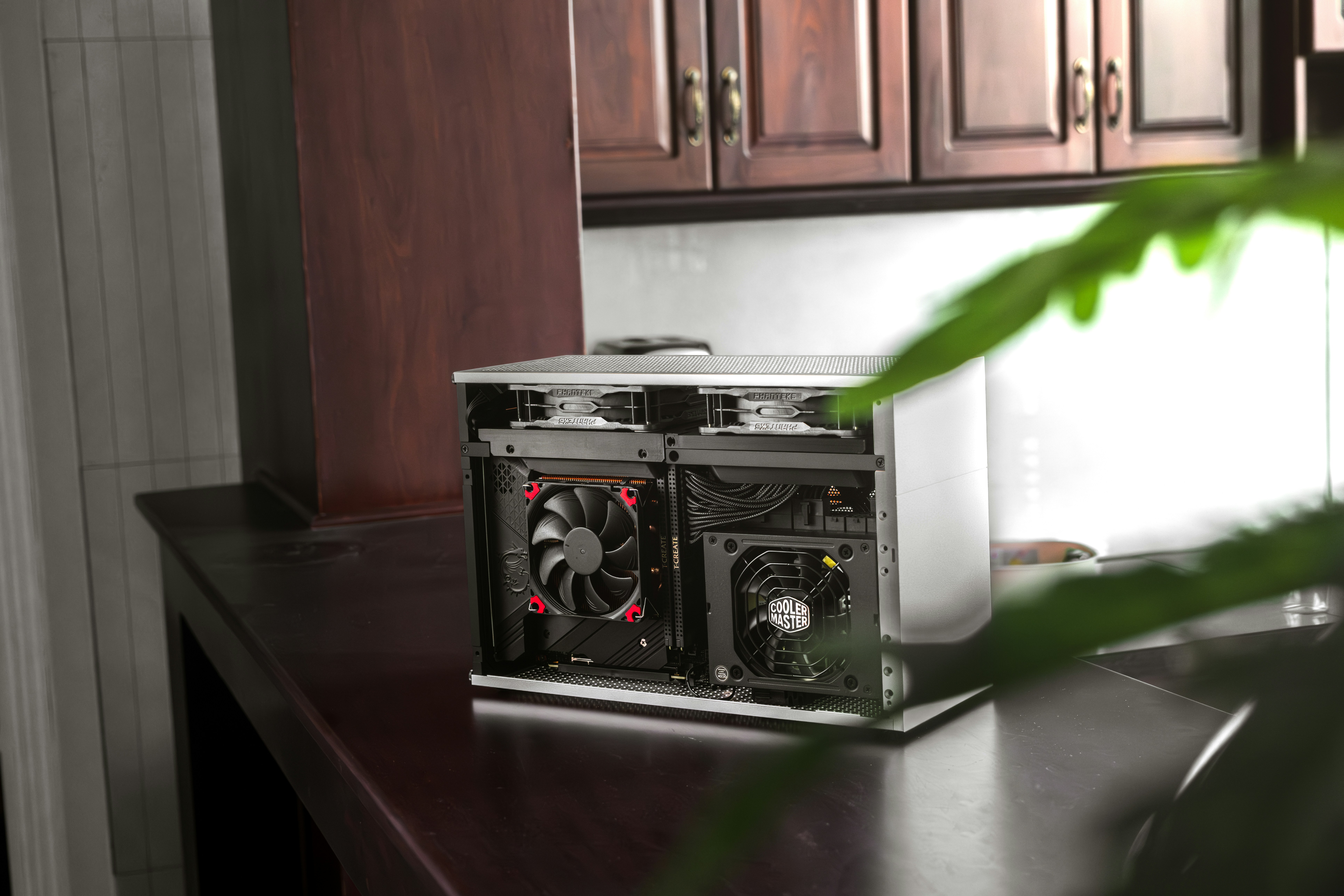 Open-Case Focus: Exposed PC Internals Bask in a Quiet Wooden Desk Glow