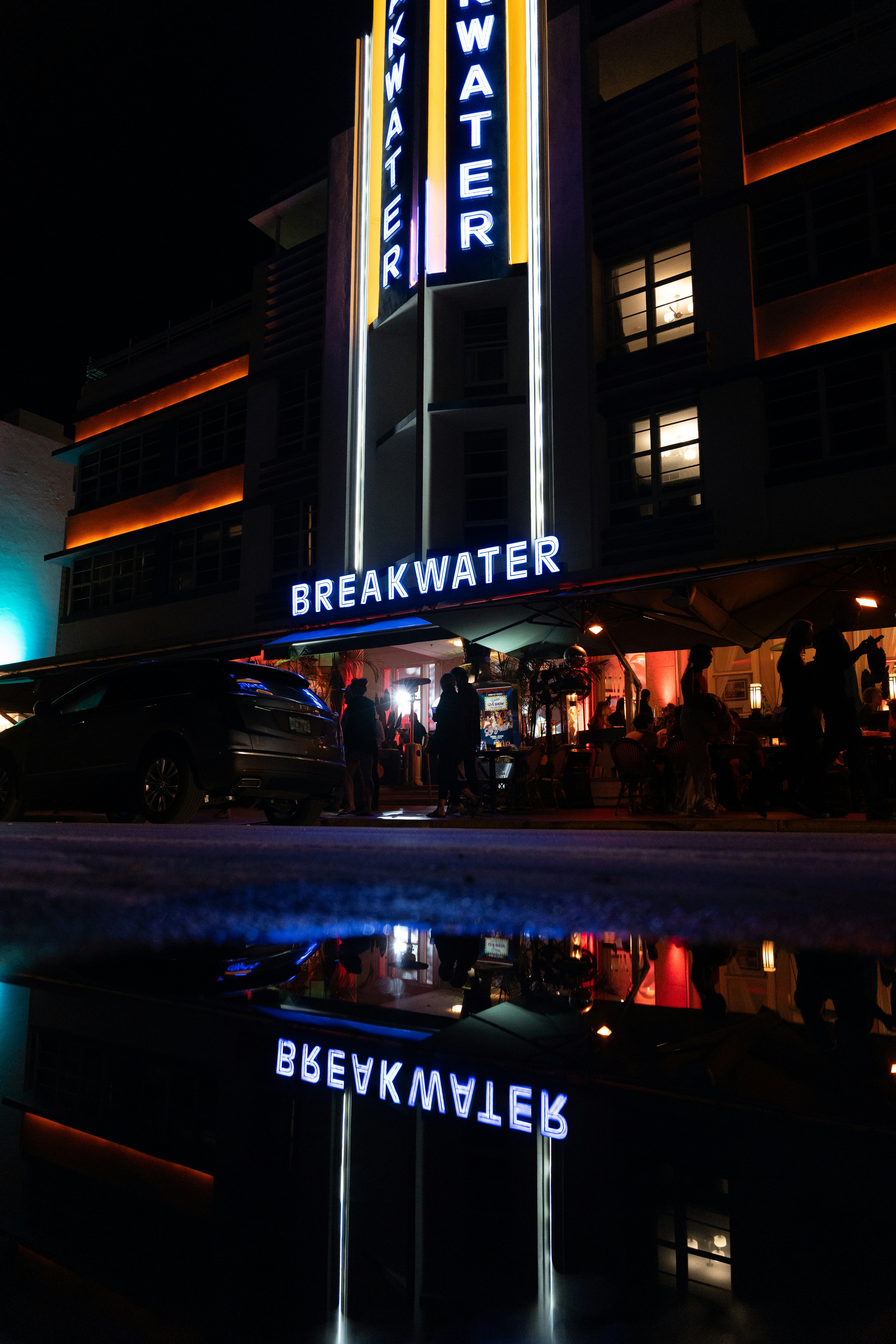 A building with a sign that says breakwater on it photo – Free Ocean ...