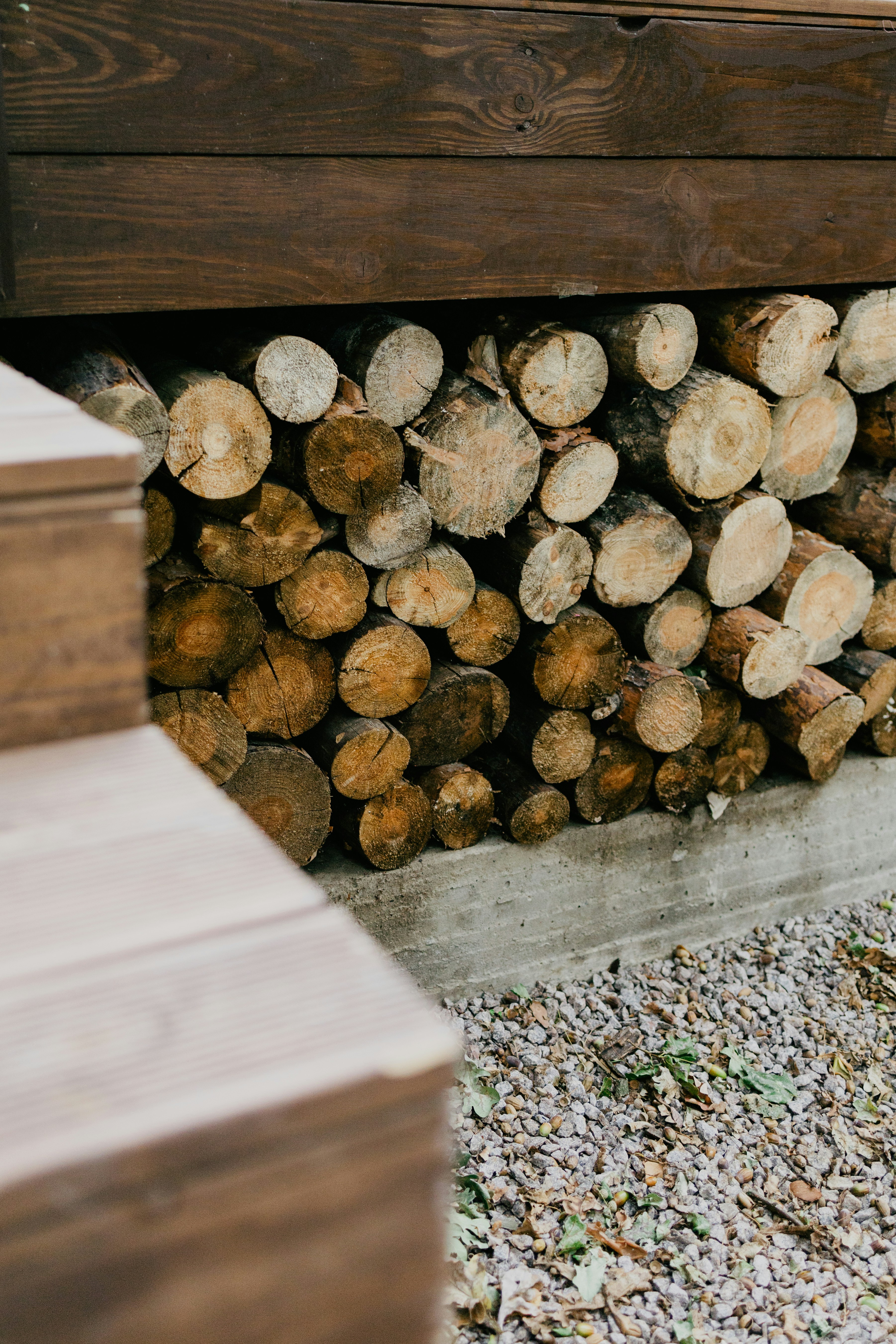 Circular end-grain rhythm under weathered planks