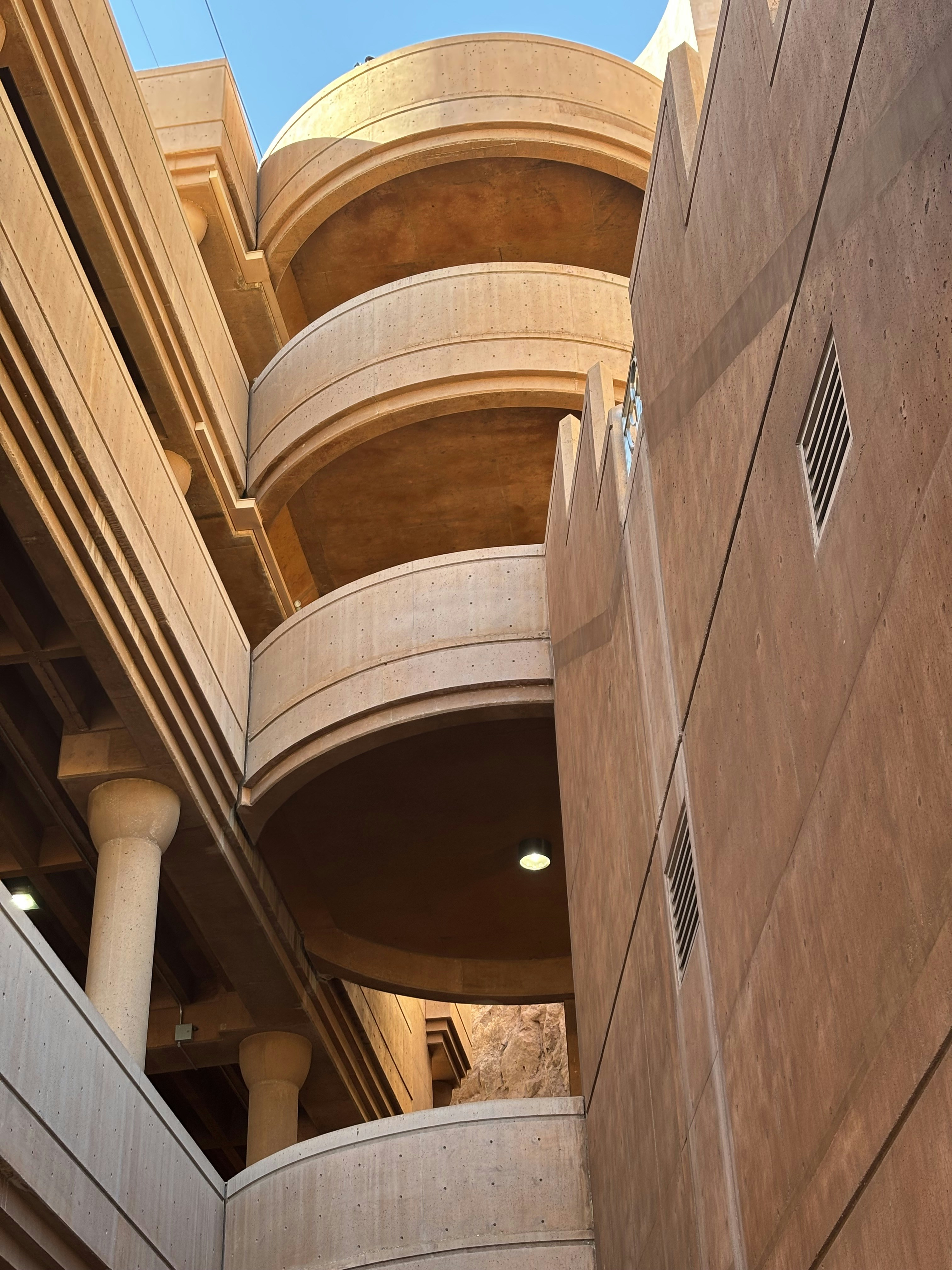 Sunlit Geometry: Circular Ramps Carved into Concrete