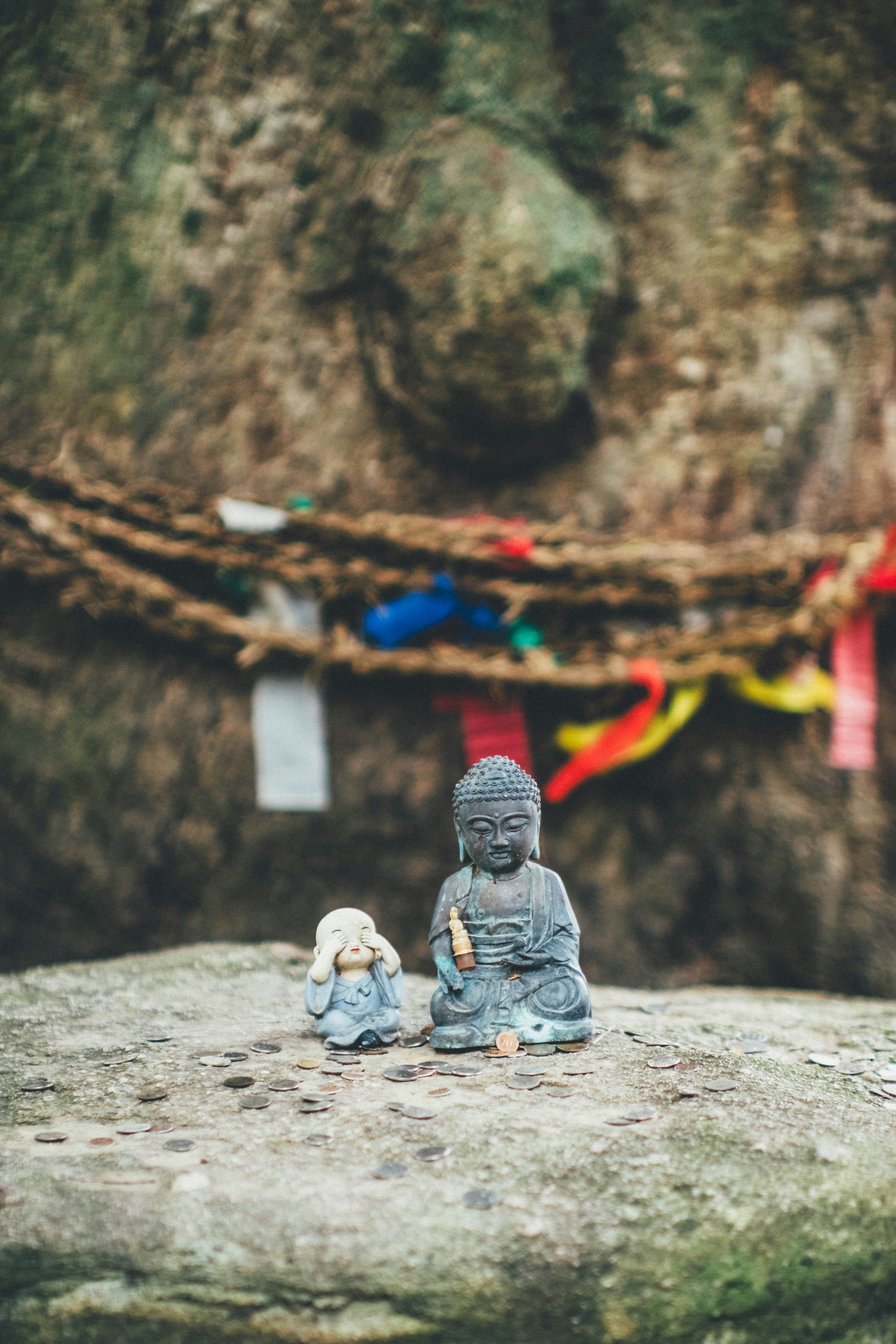 Silent Buddhas on a Weathered Stone