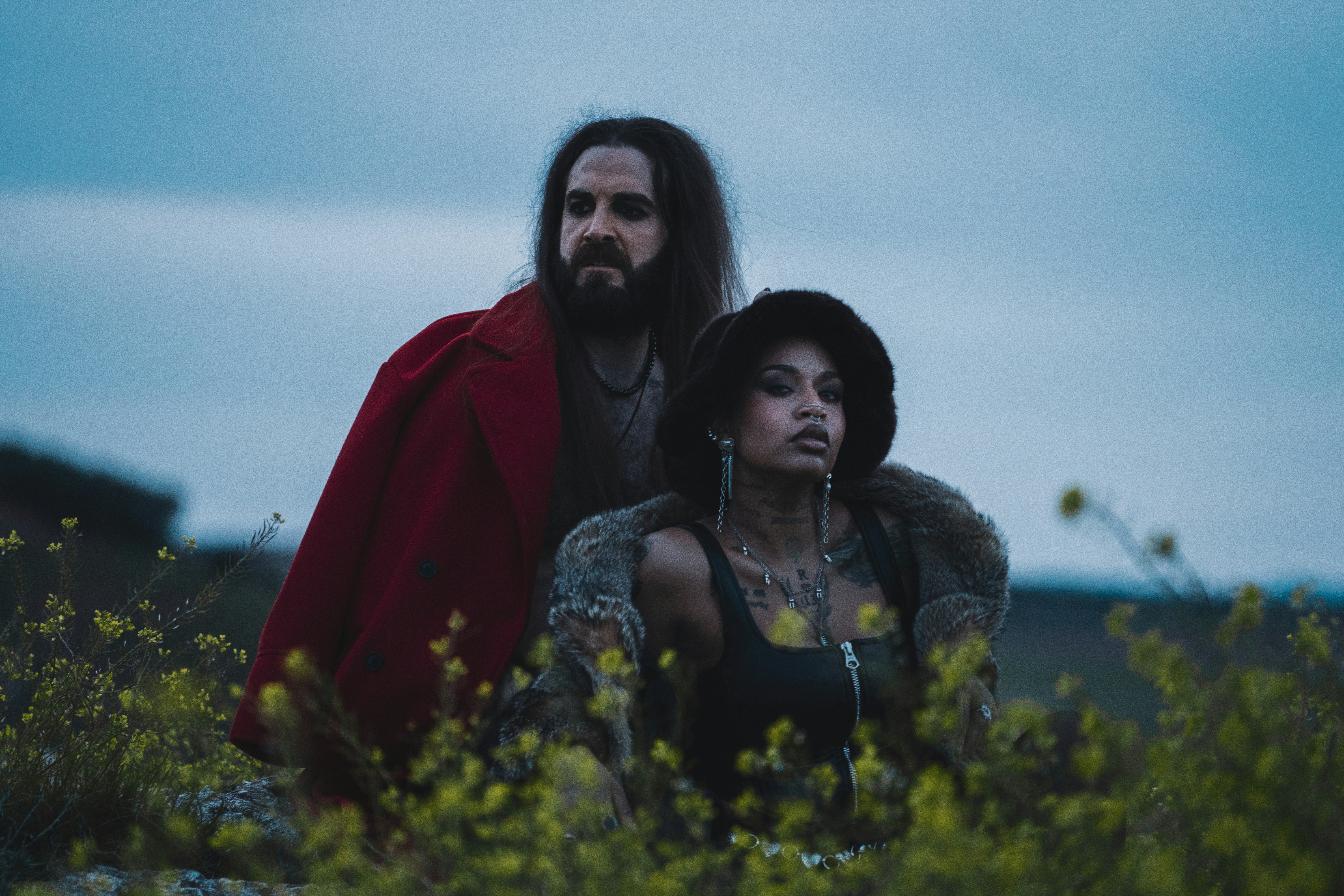 Two Figures in a Field of Yellow: Dusk Portrait in Wind-kissed Wildflowers