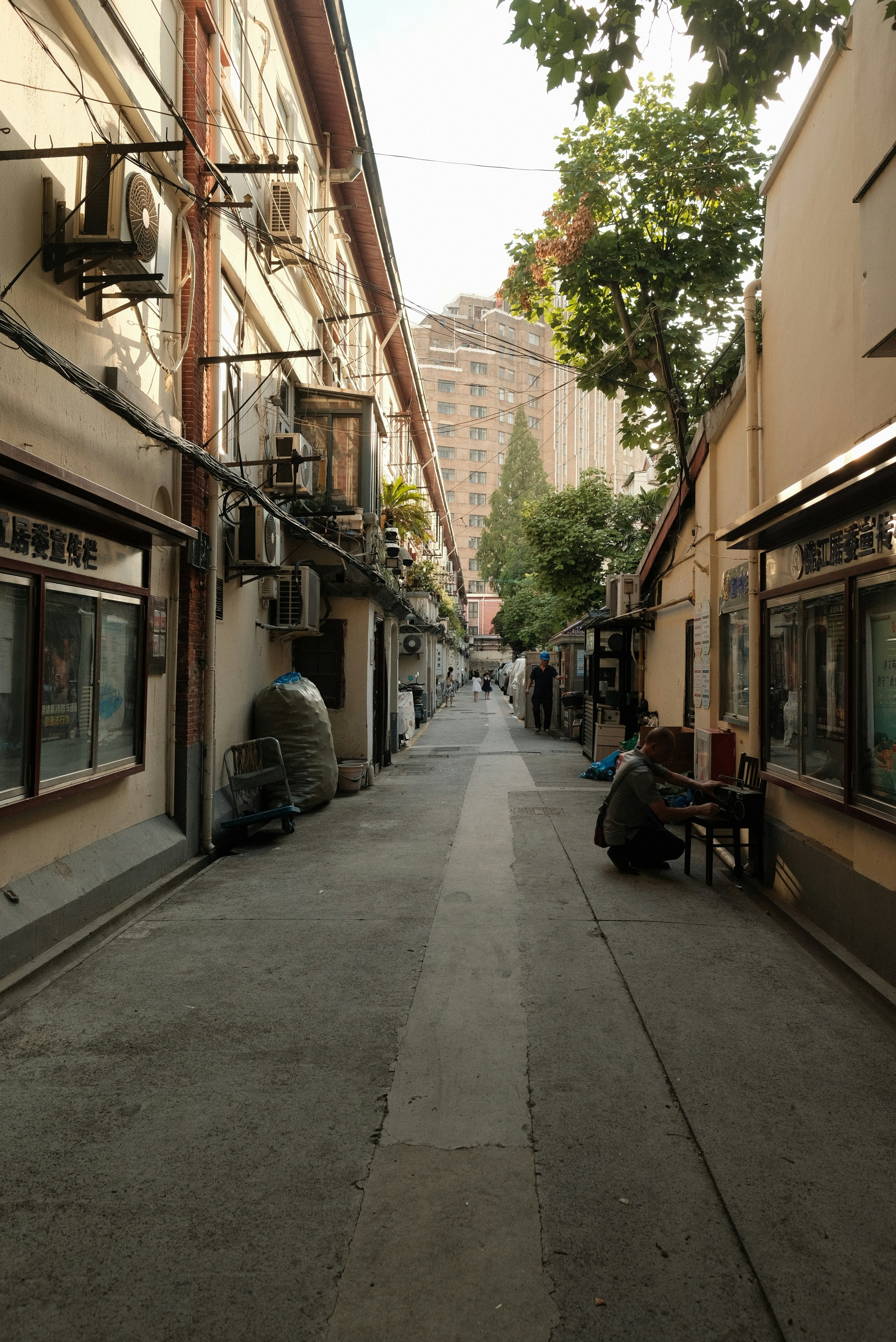 Converging Quiet: Warm Evening Light in a Narrow Alley