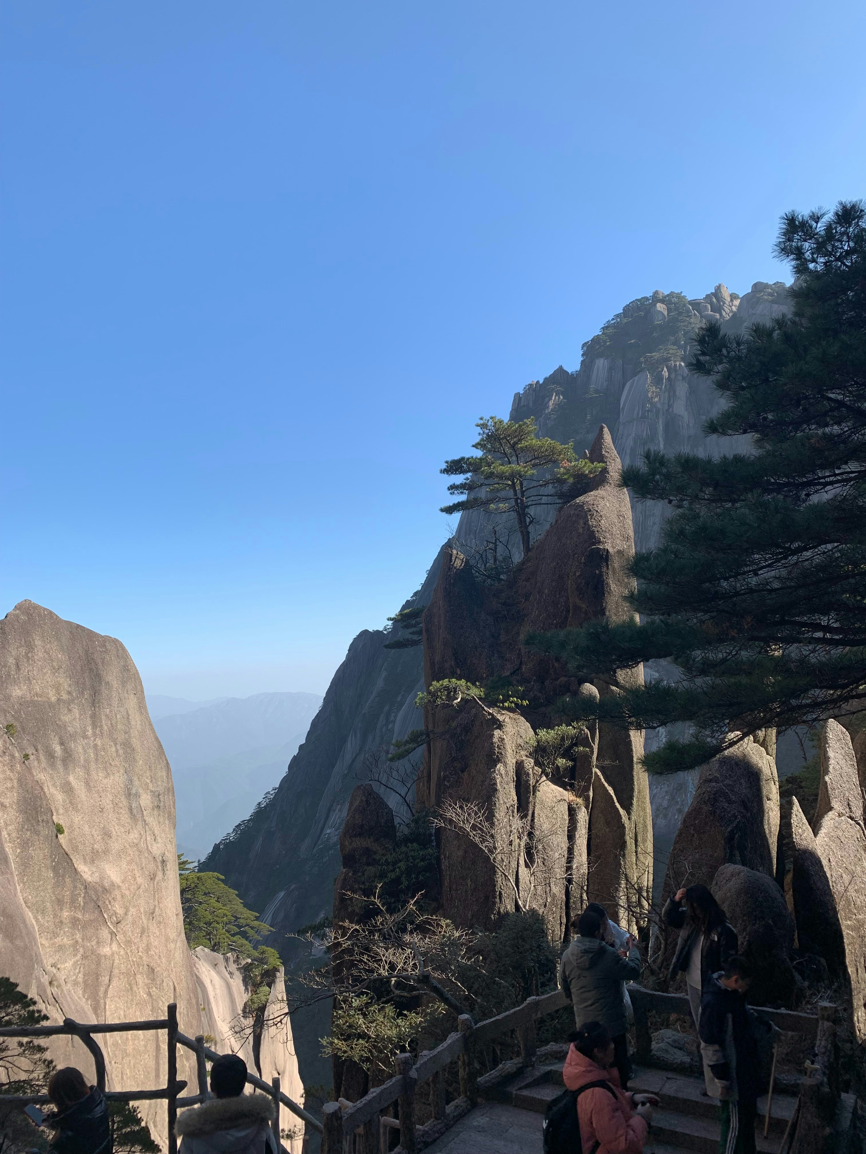 Granite Guardians along a Cliffside Path