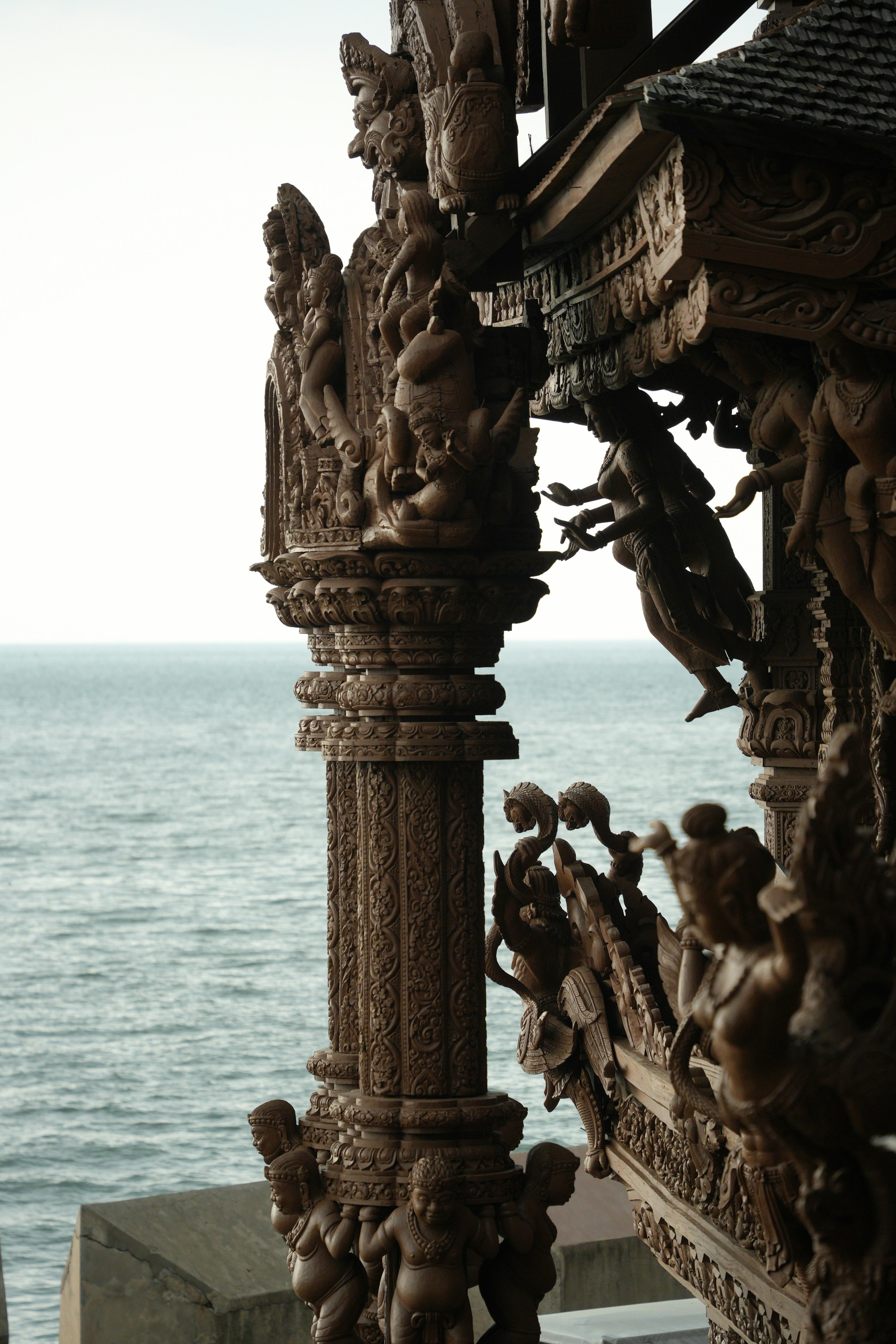 Carved Architectural Panels Framing Ocean Horizon