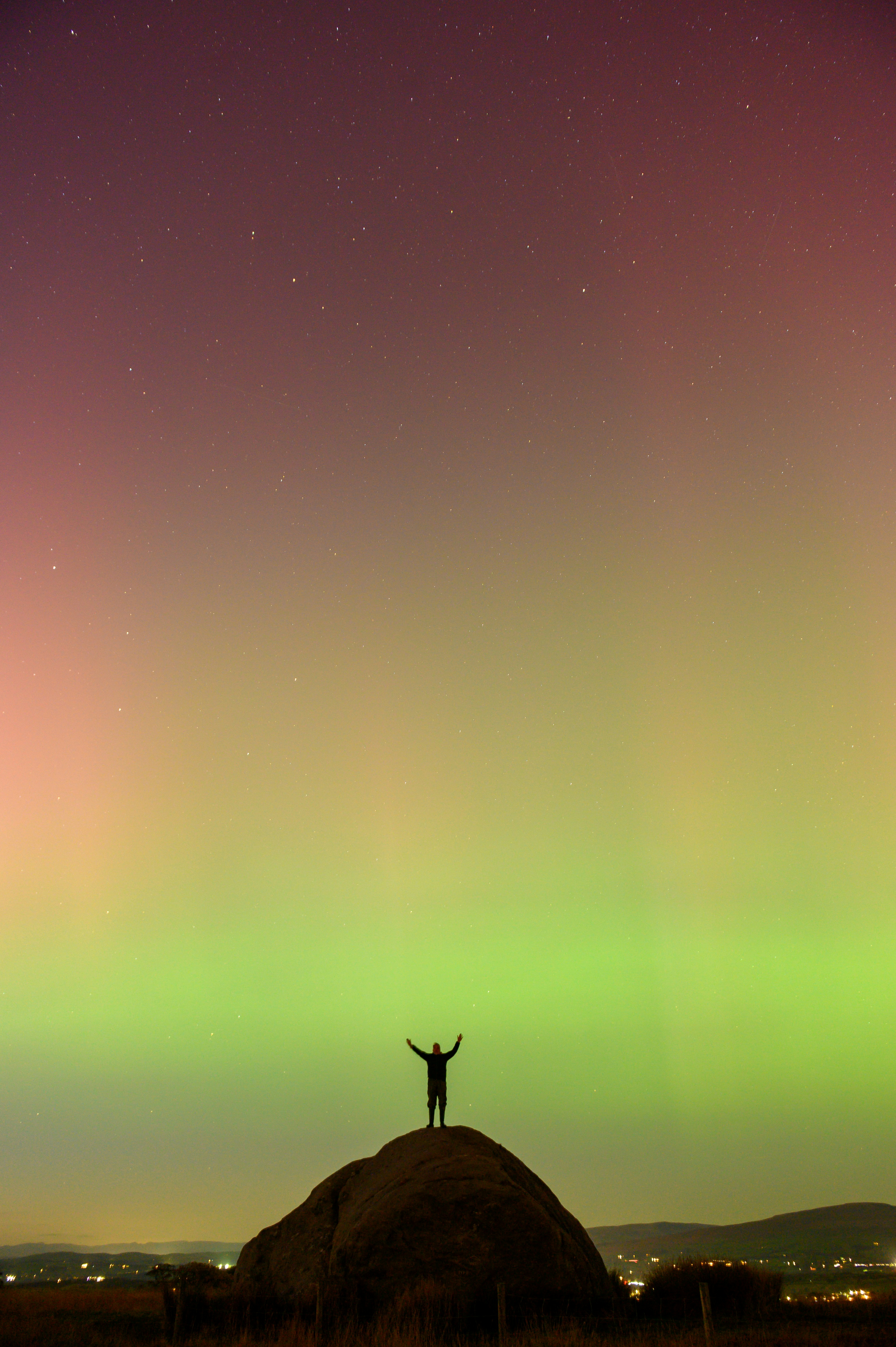 Celestial Celebration Under Aurora's Embrace