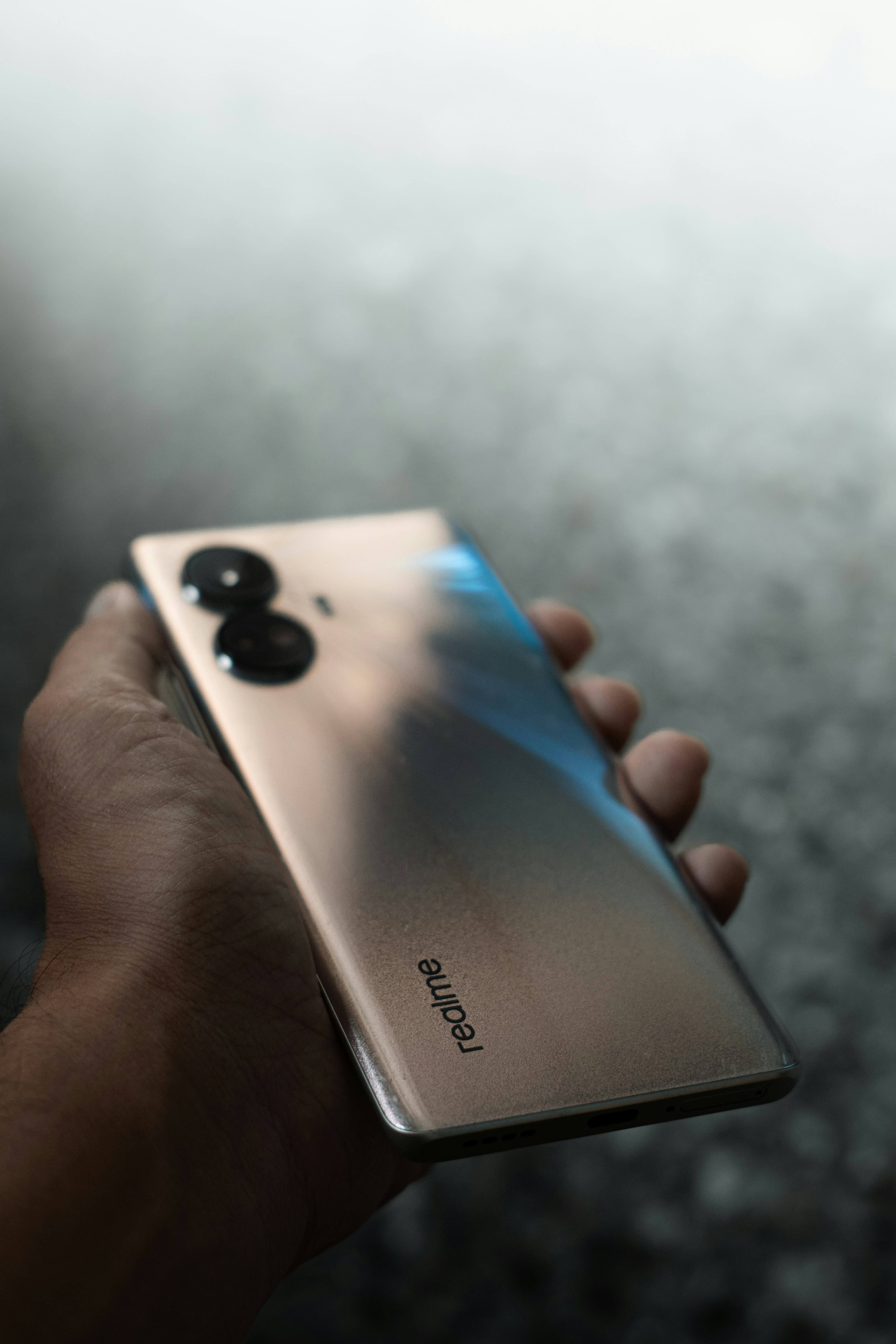 Glassy Gradient: A Moment with a Realme Smartphone