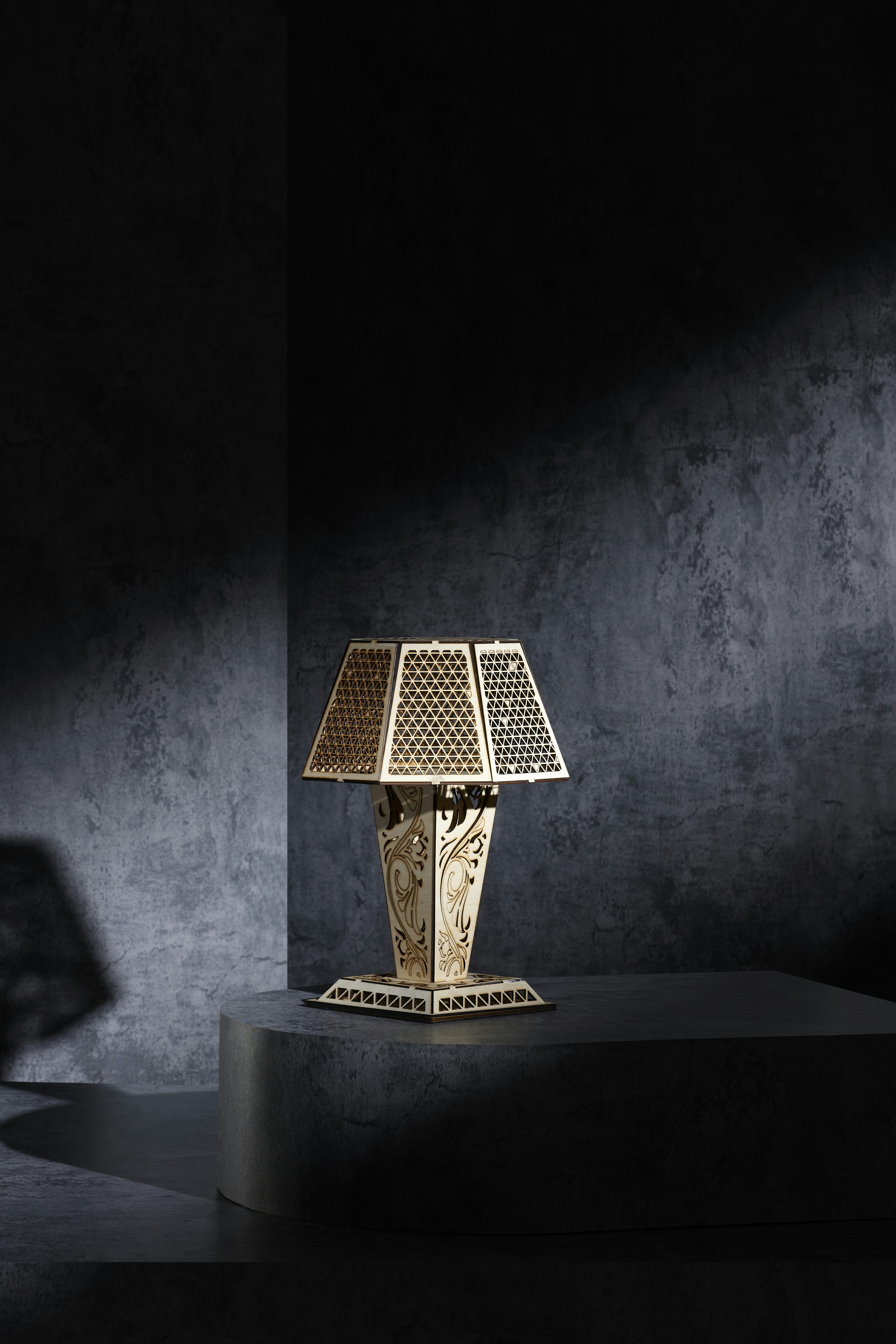 Ornate Lattice Lamp on a Shadowed Pedestal