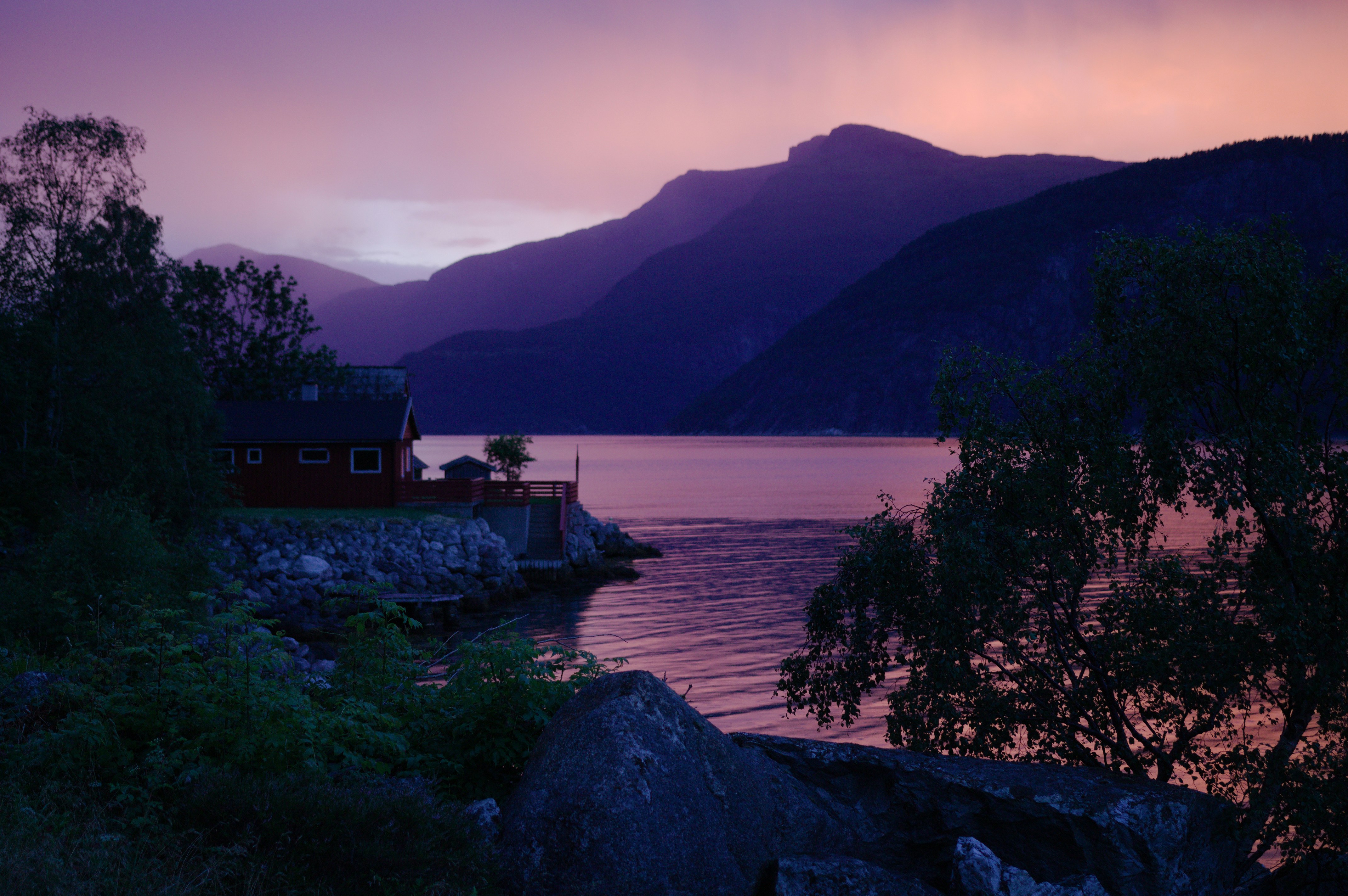 Twin Peaks over Quiet Fjord at Dusk