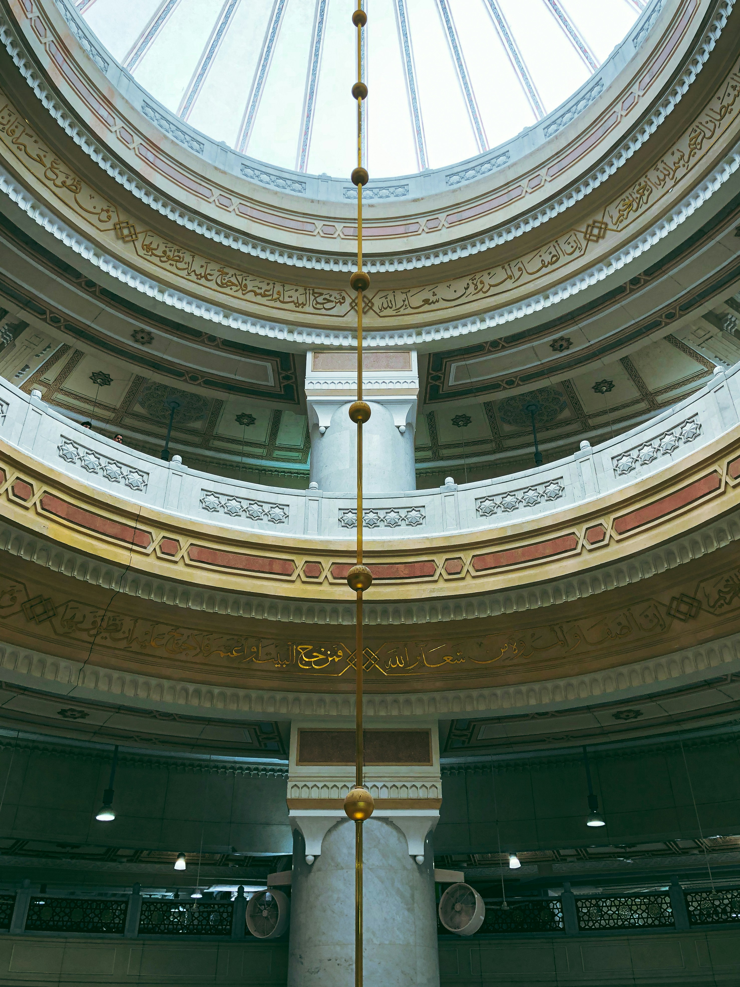 Central Meridian of a Domed Interior: Gold Rod Amid Concentric Arches