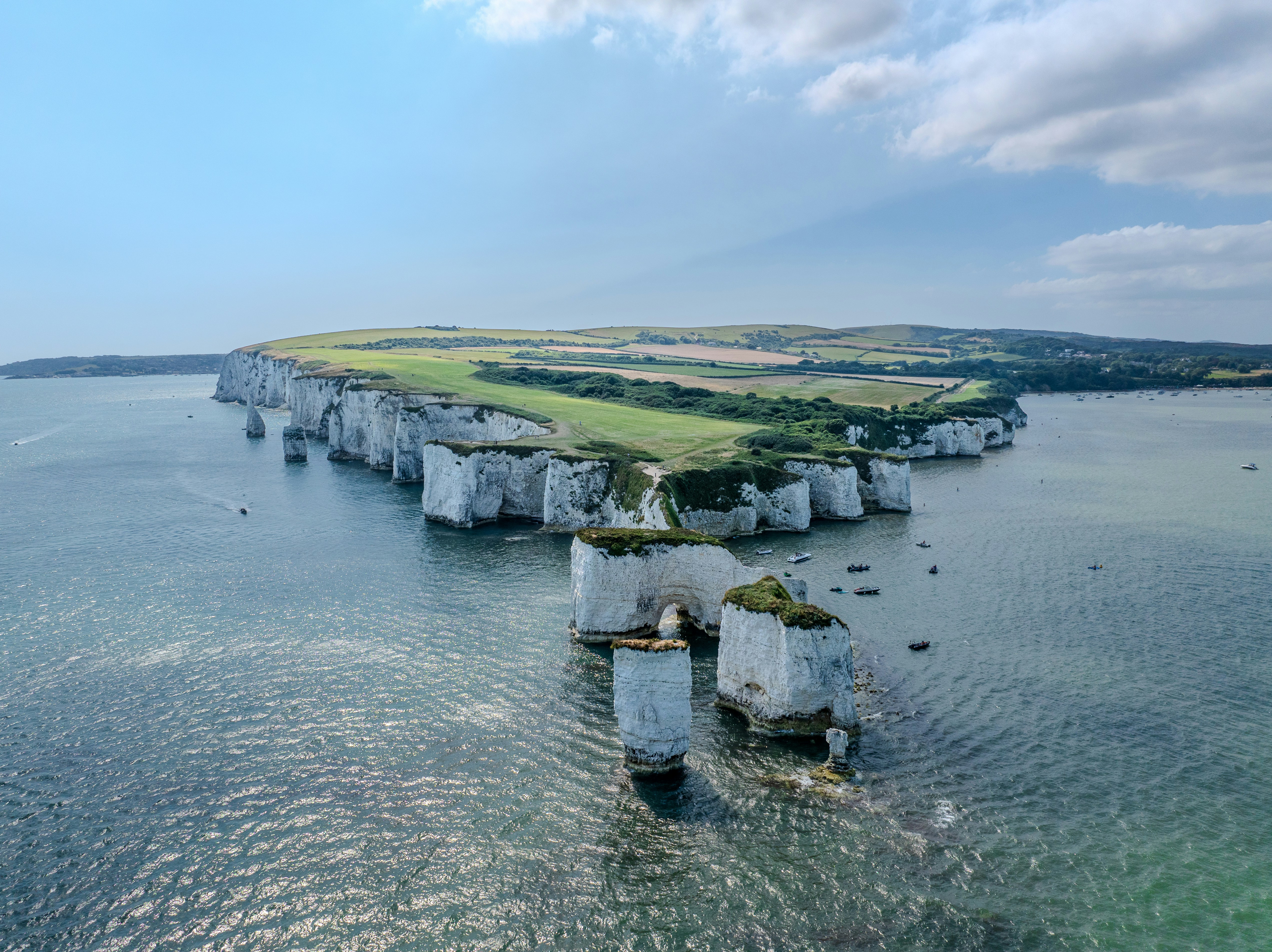 Cliff-edged Promontory Stretches into the Sea at Dusk