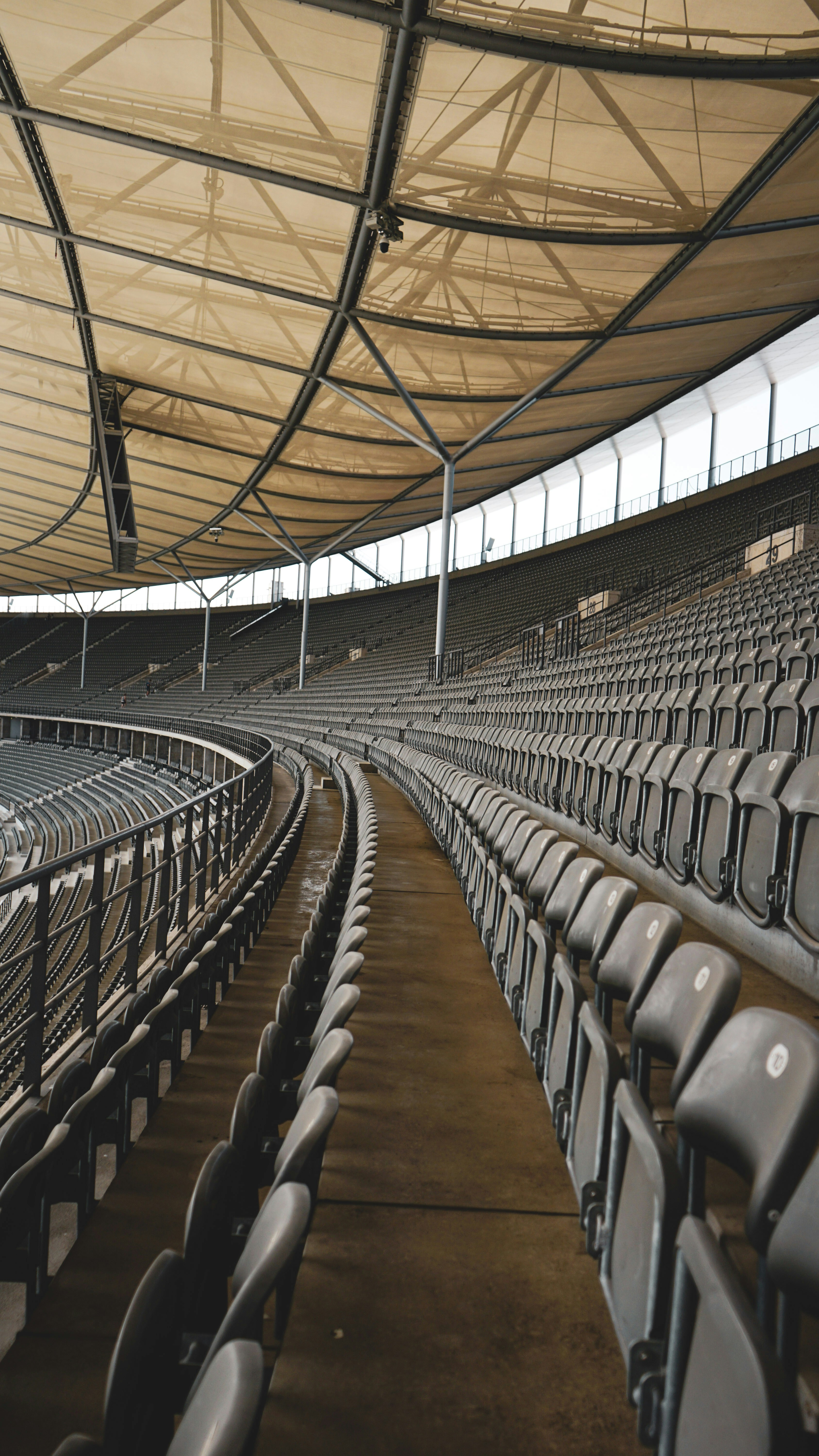 A large empty stadium filled with lots of seats photo – Free ...