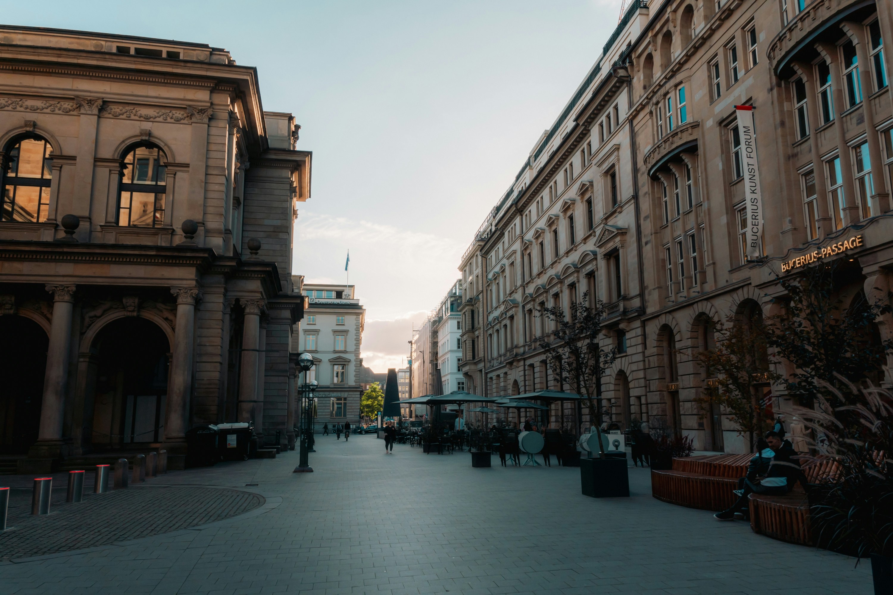 A city street lined with tall brown buildings photo – Free Architecture ...