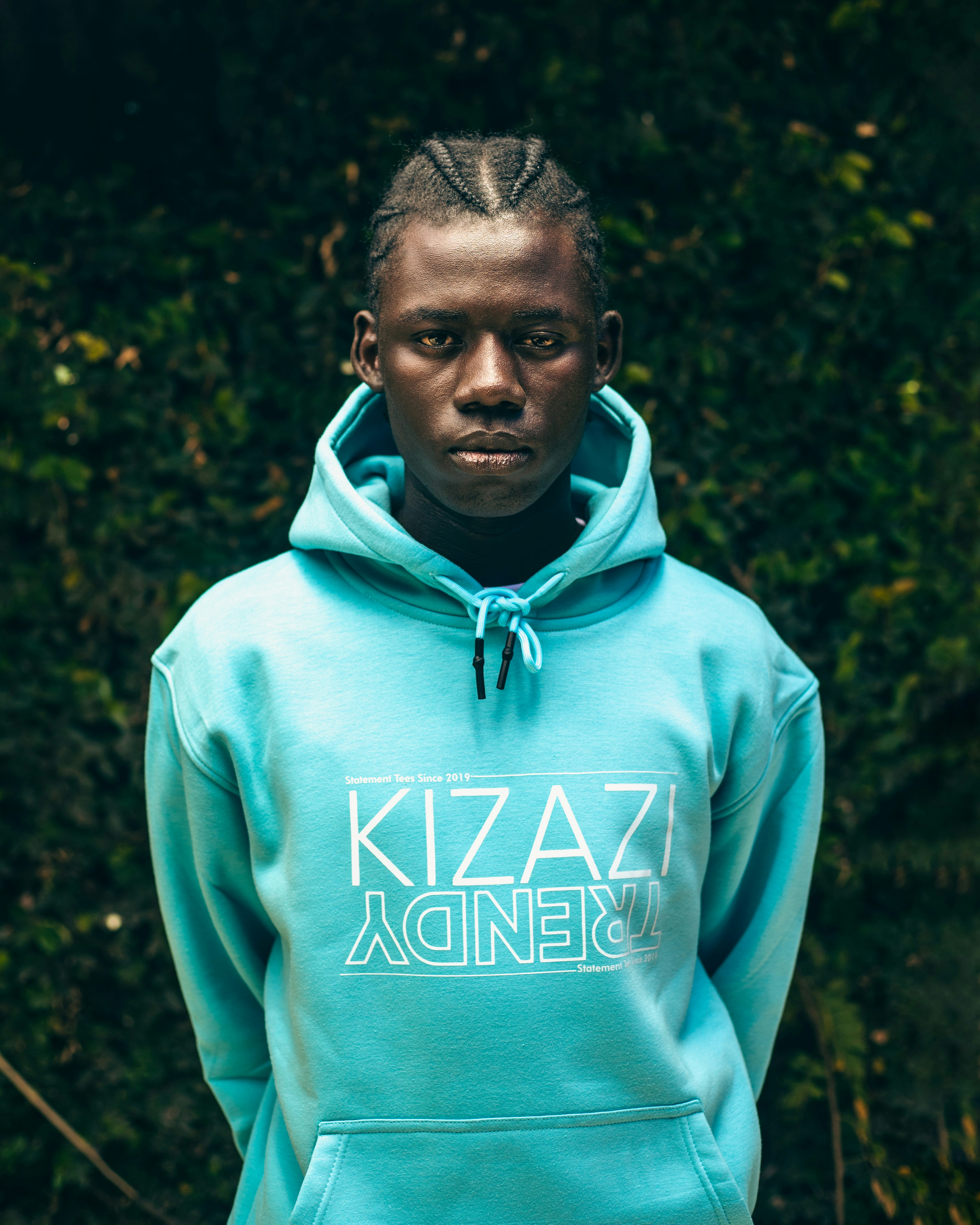 A man with dreadlocks wearing a blue hoodie photo – Free Nairobi Image ...