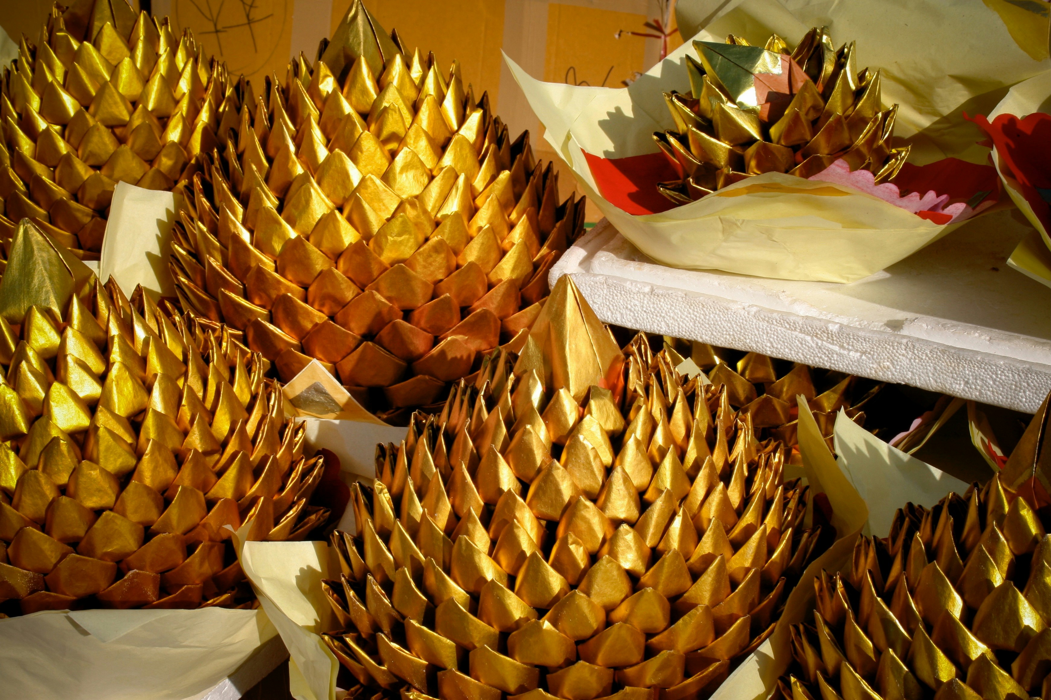 Golden Pinecone Blossoms: A Palette of Artful Folds
