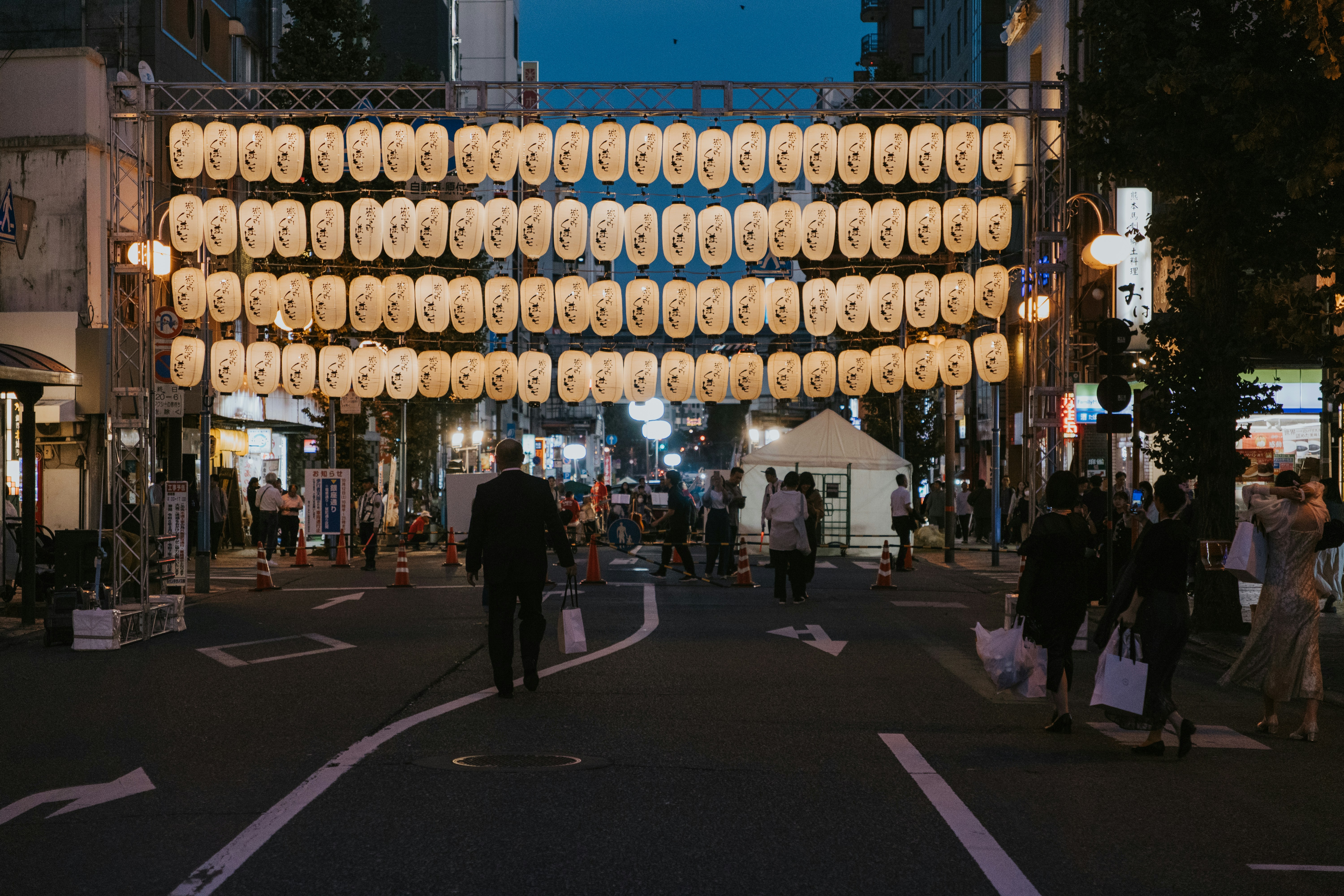 Lantern Corridor Over a City Night Market