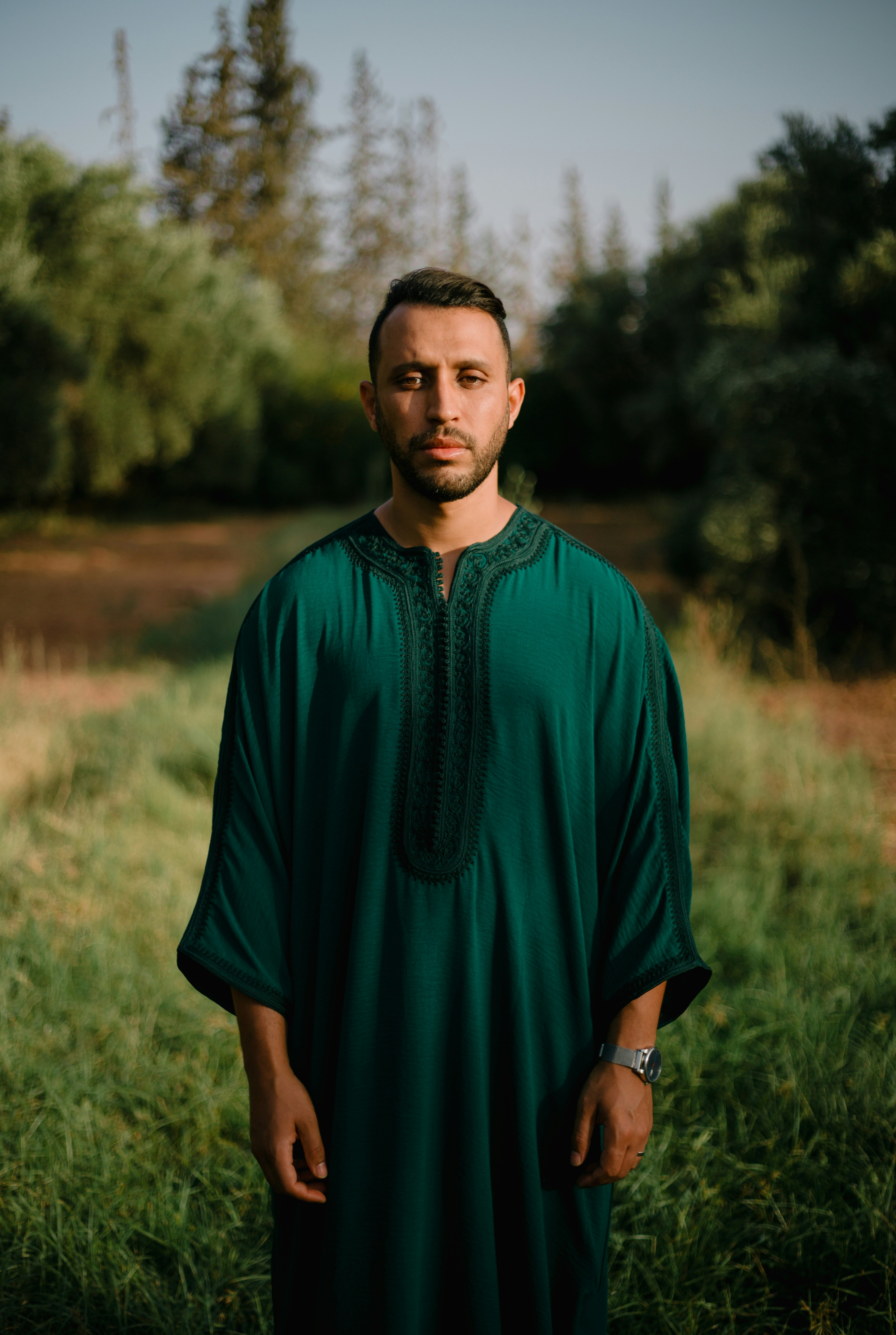 Emerald Draped Portrait in a Sunlit Field