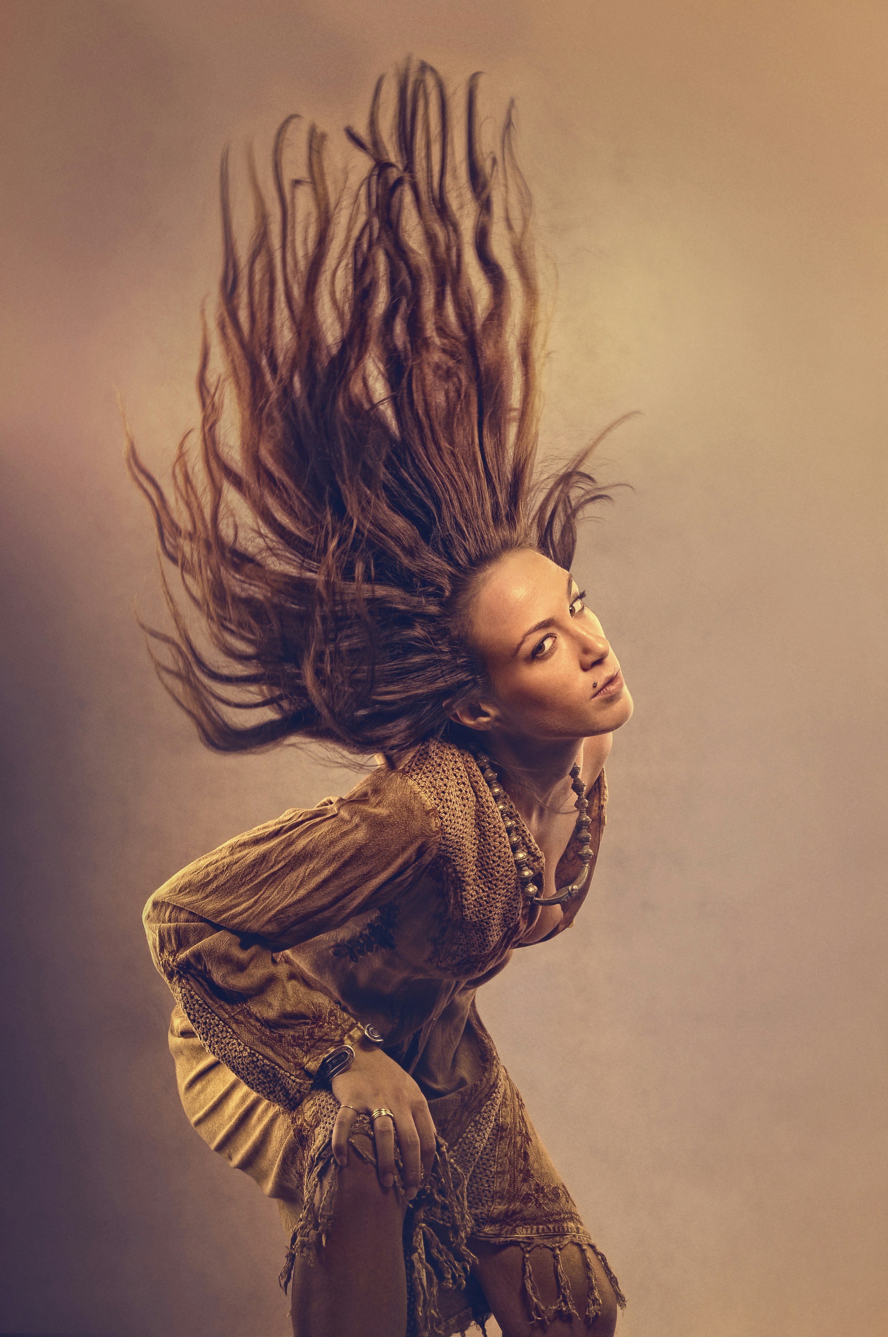 Whirlwind Portrait: wind-sculpted hair and vintage textures